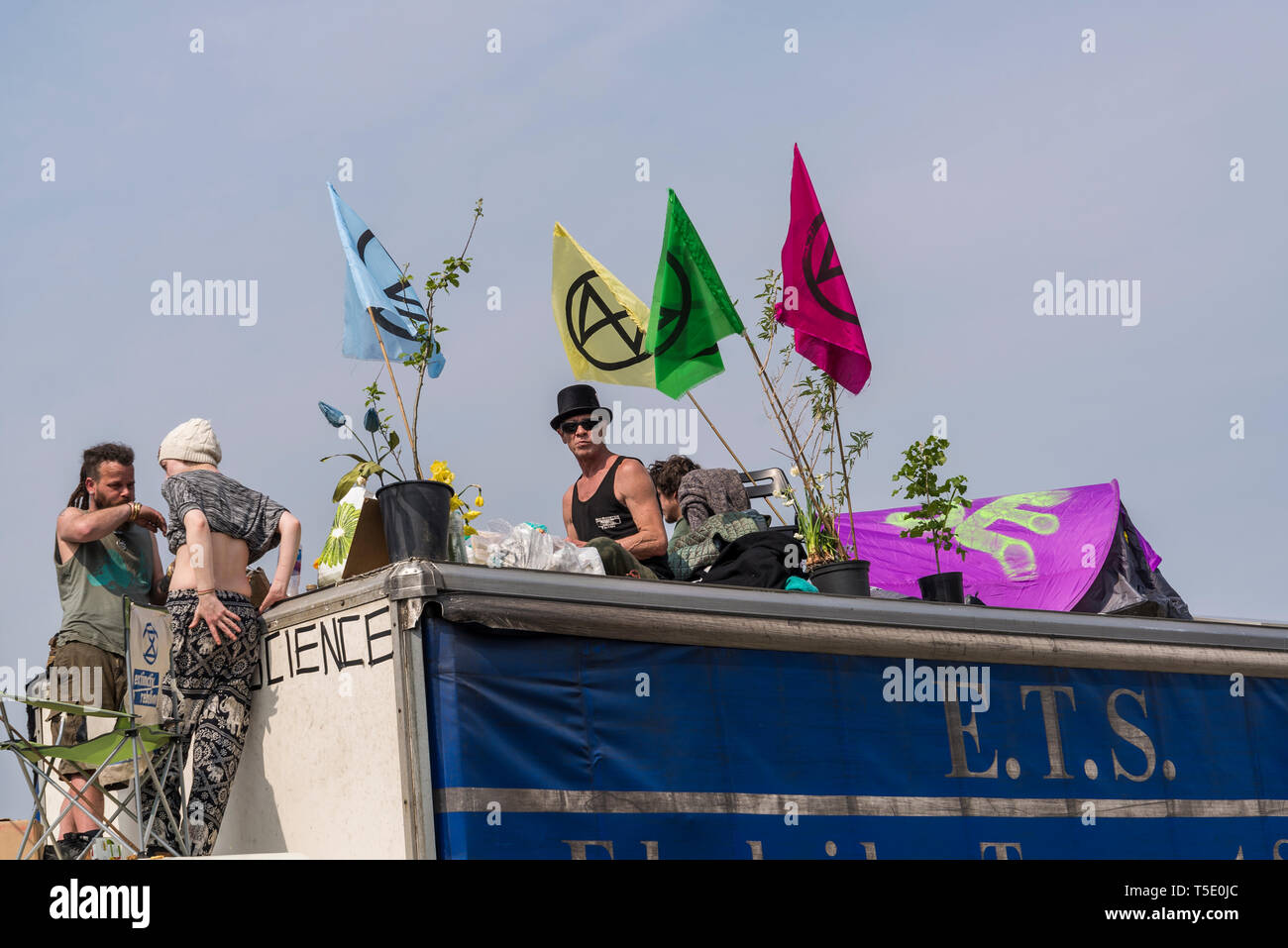 Extinction Rebellion protest on Waterloo Bridge, People on top of the ...