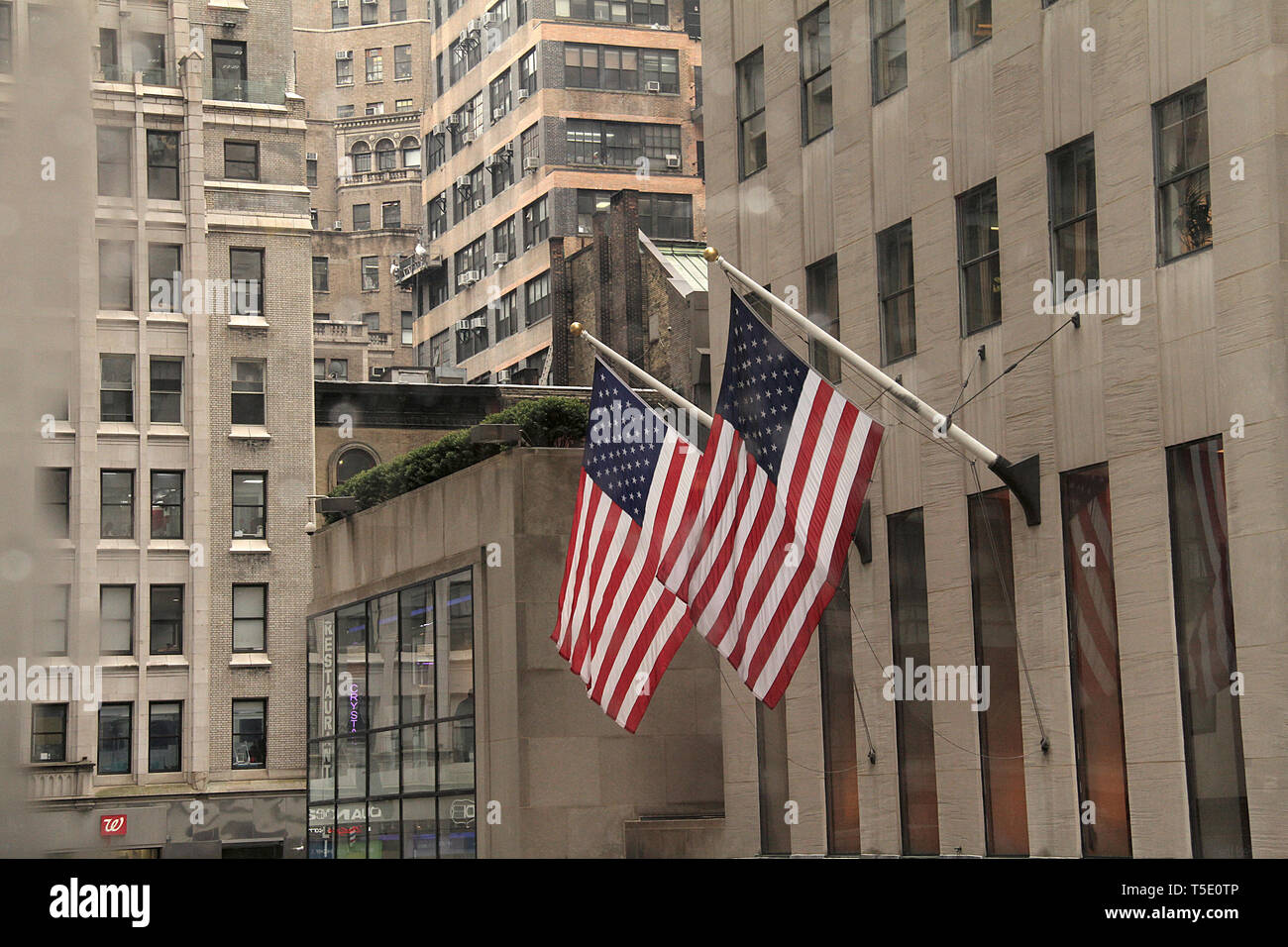 Us flags on buildings hi-res stock photography and images - Alamy