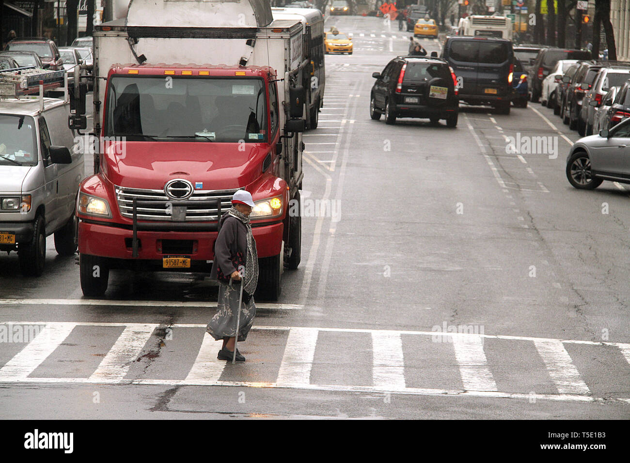 Old lady crossing road hi-res stock photography and images - Alamy