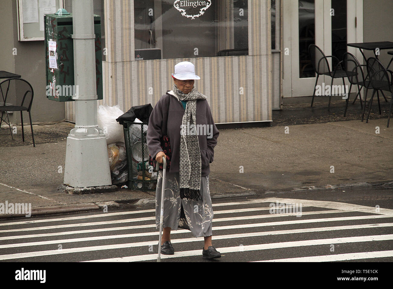 Old lady crossing road hi-res stock photography and images - Alamy