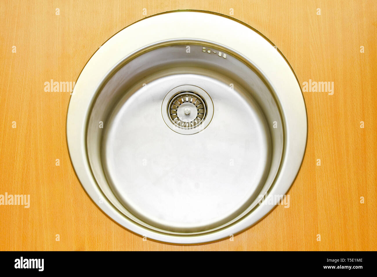 Top view of round stainless steel sink Stock Photo - Alamy