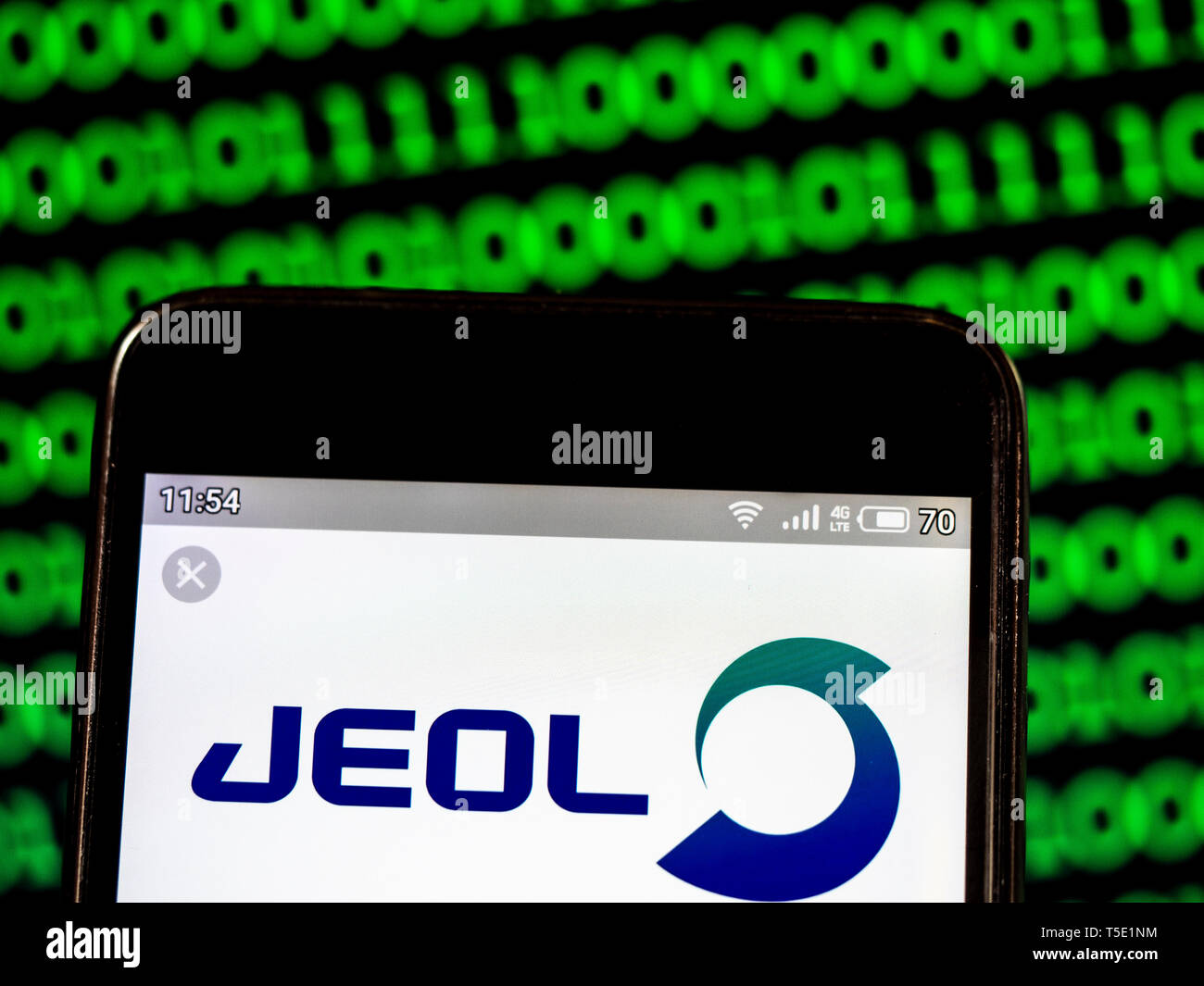 In this photo illustration a JEOL Ltd. logo seen displayed on a smart ...