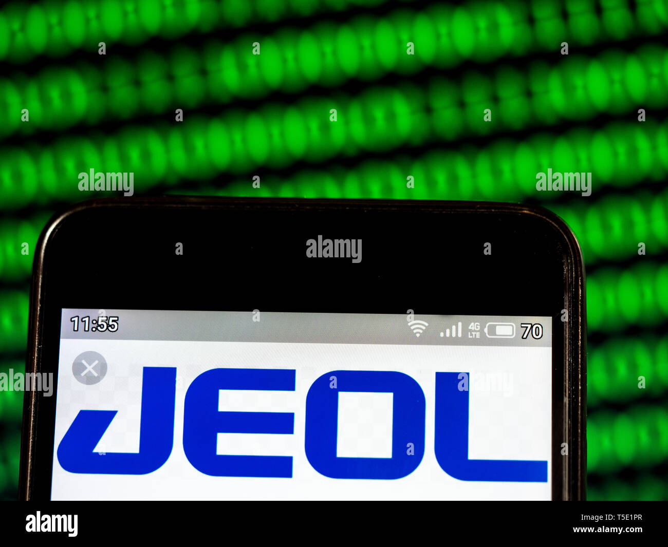In this photo illustration a JEOL Ltd. logo seen displayed on a smart ...