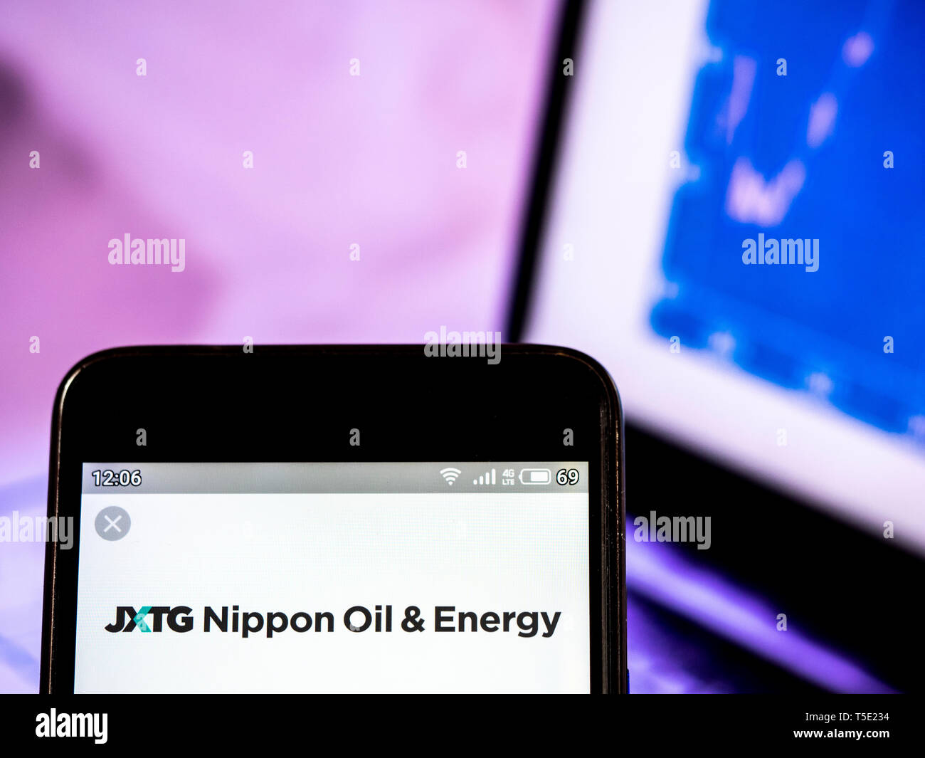 In this photo illustration a JXTG Nippon Oil & Energy Corporation logo ...