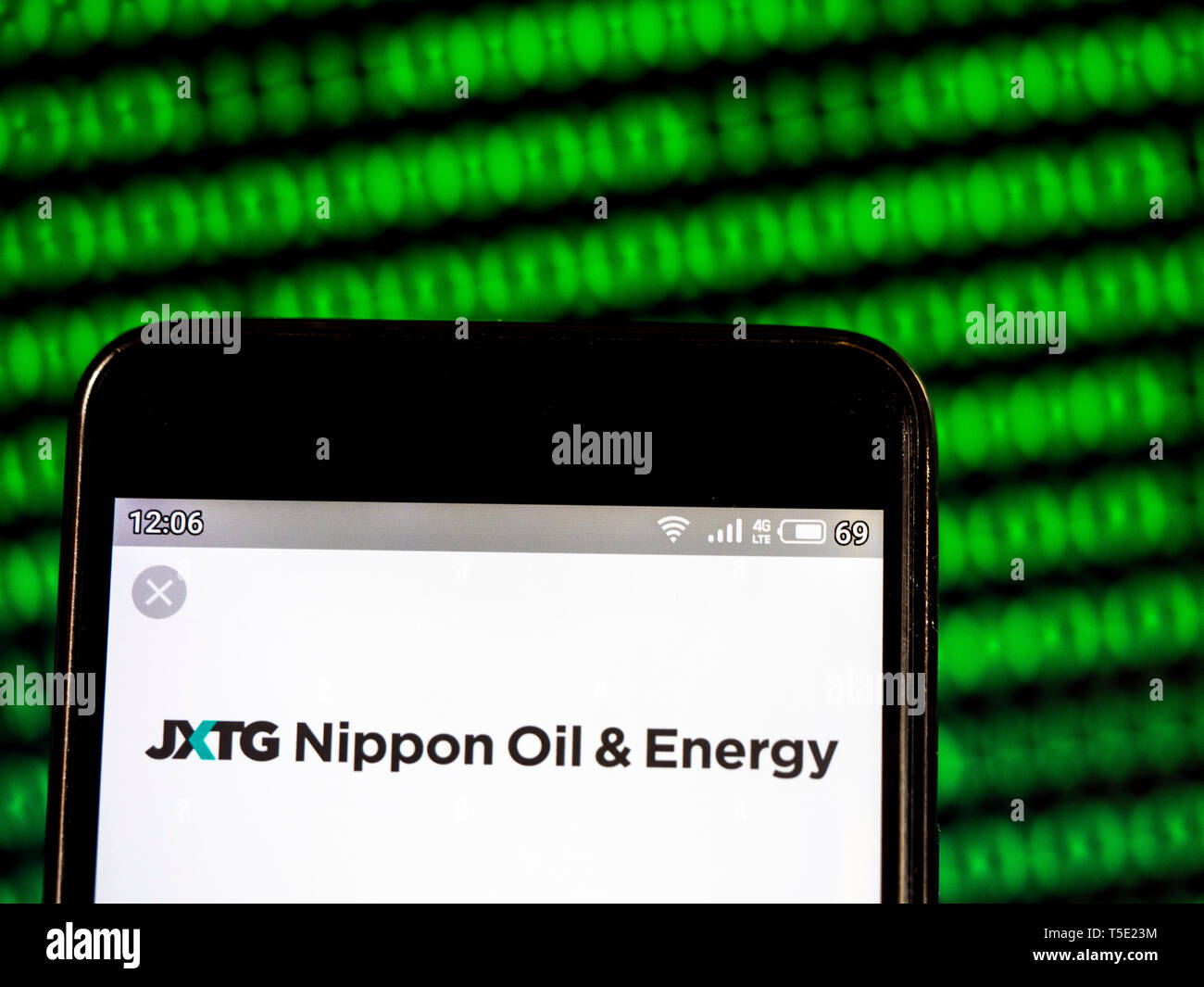 In this photo illustration a JXTG Nippon Oil & Energy Corporation logo ...