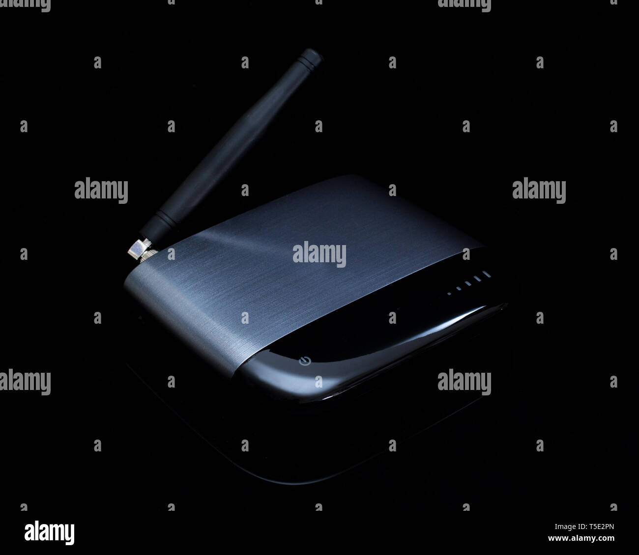 Wireless router on black Stock Photo - Alamy