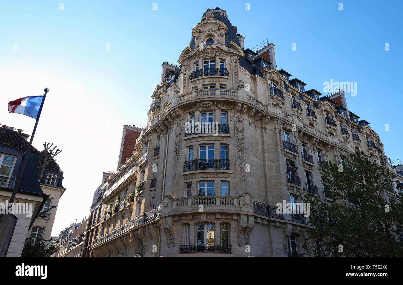 Traditional French house with typical balconies and windows. Paris ...
