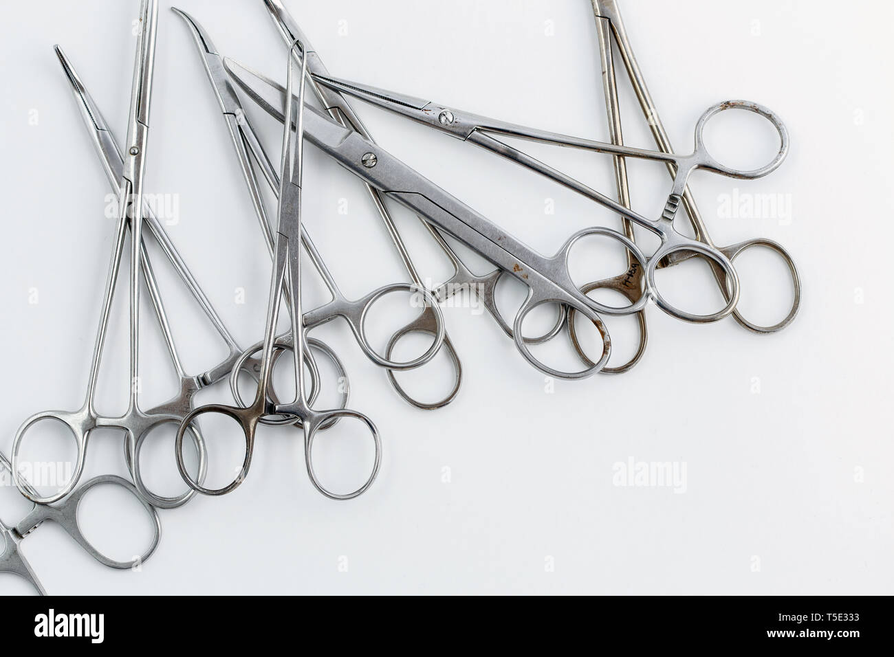 surgical instruments on white background Stock Photo - Alamy