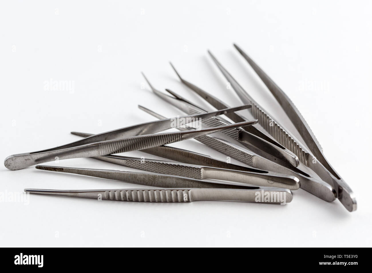 surgical instruments on white background Stock Photo - Alamy