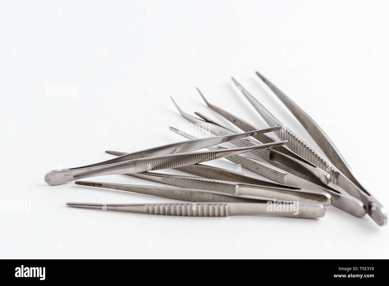 surgical instruments on white background Stock Photo - Alamy