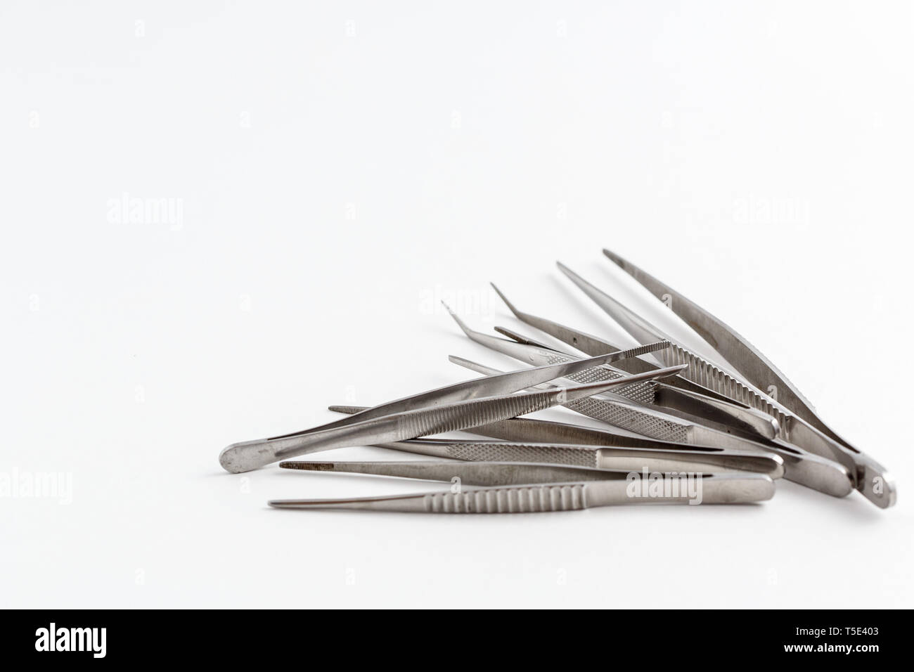 surgical instruments on white background Stock Photo - Alamy
