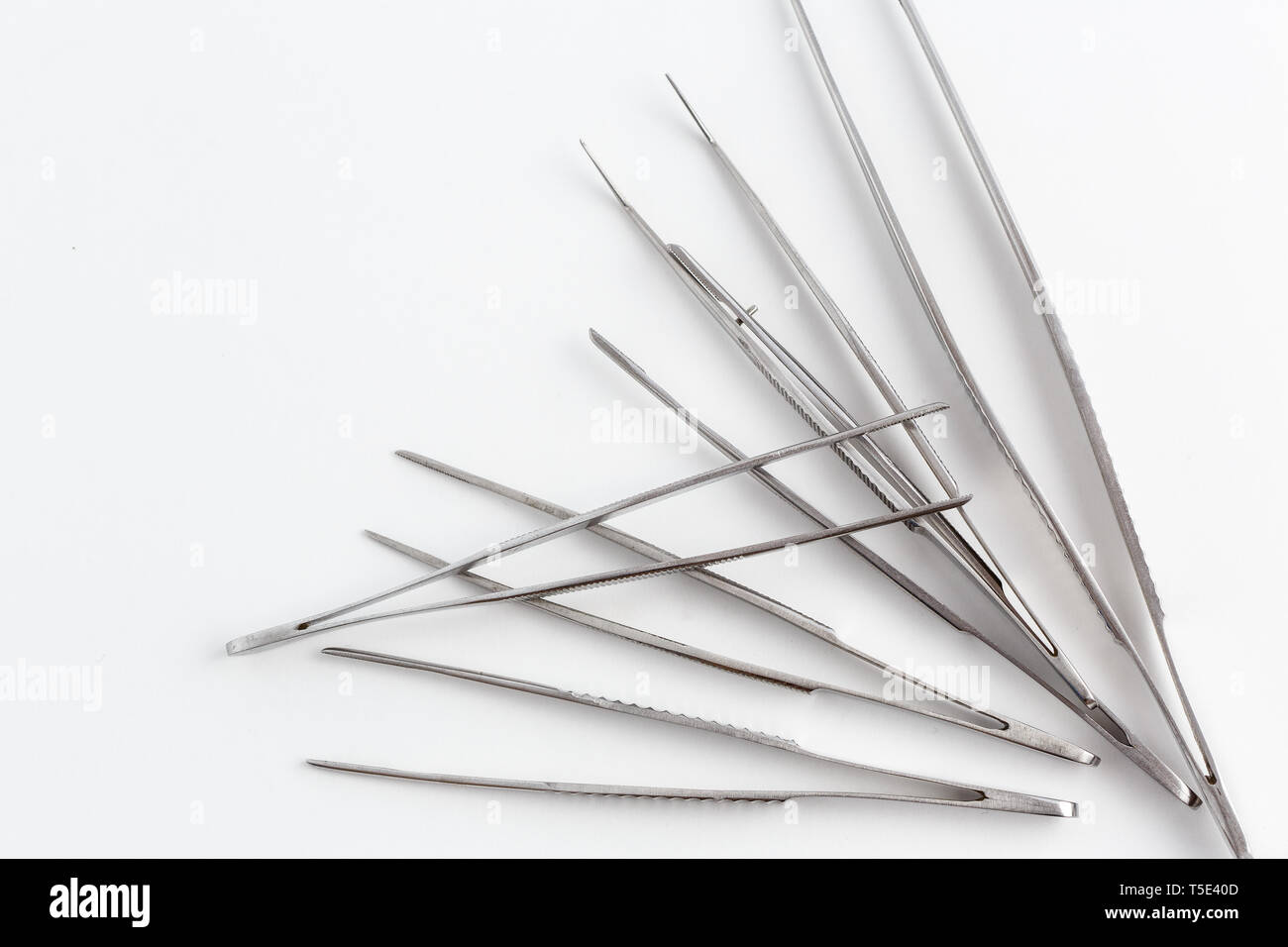 surgical instruments on white background Stock Photo - Alamy