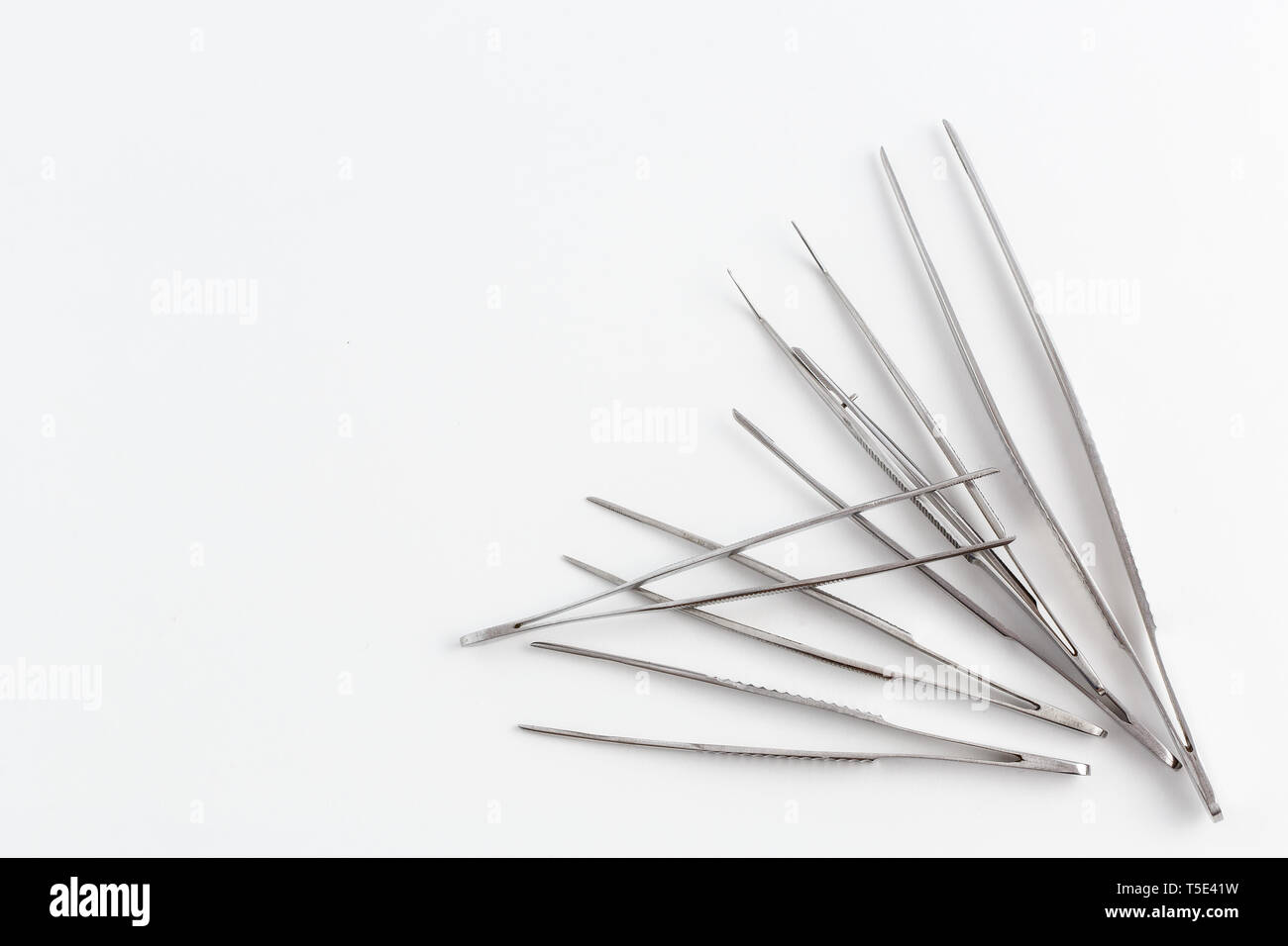 surgical instruments on white background Stock Photo - Alamy