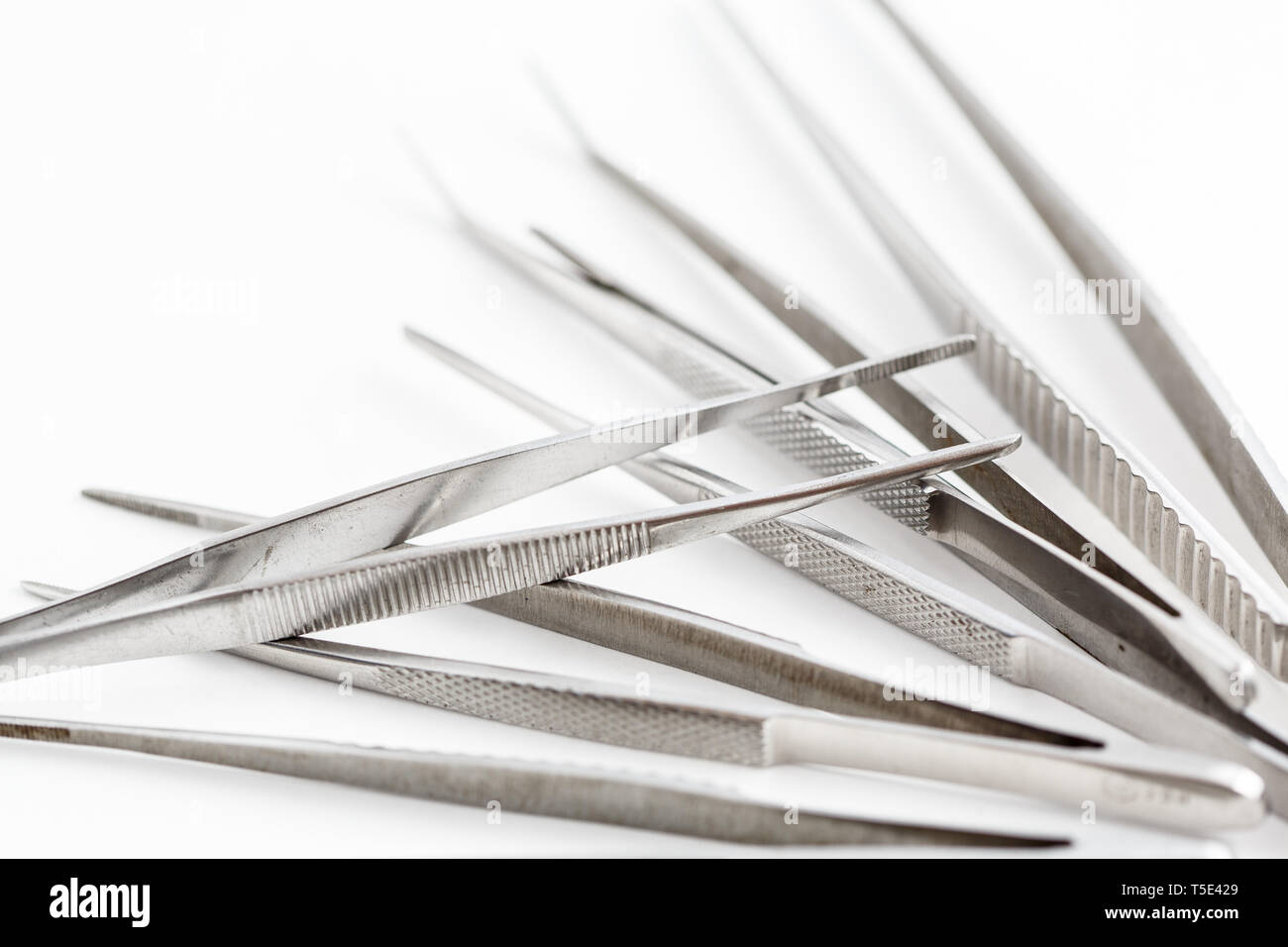 surgical instruments on white background Stock Photo - Alamy