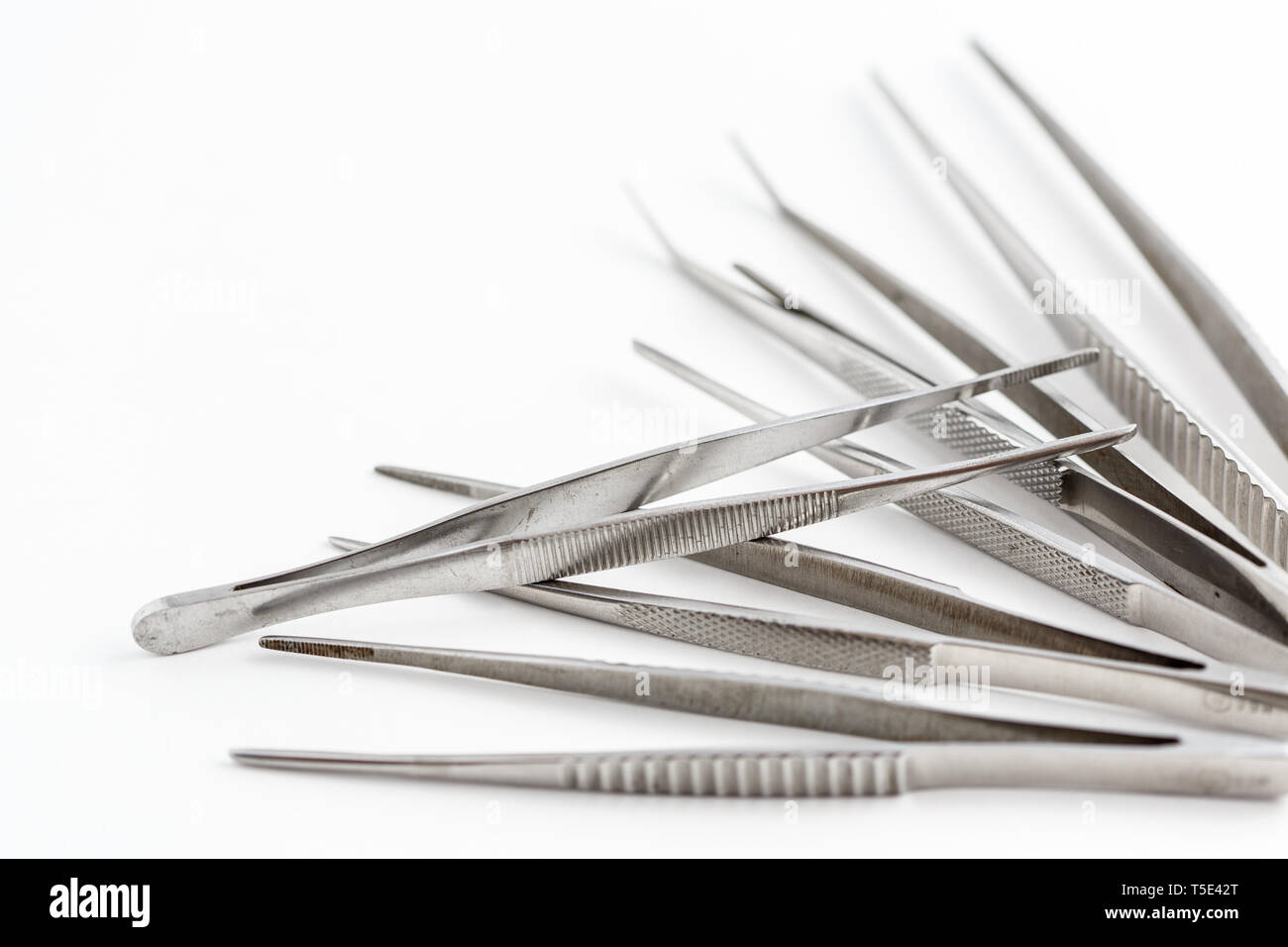 surgical instruments on white background Stock Photo - Alamy