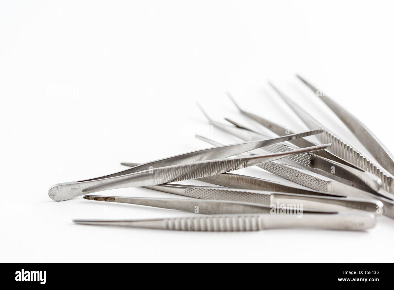 surgical instruments on white background Stock Photo - Alamy