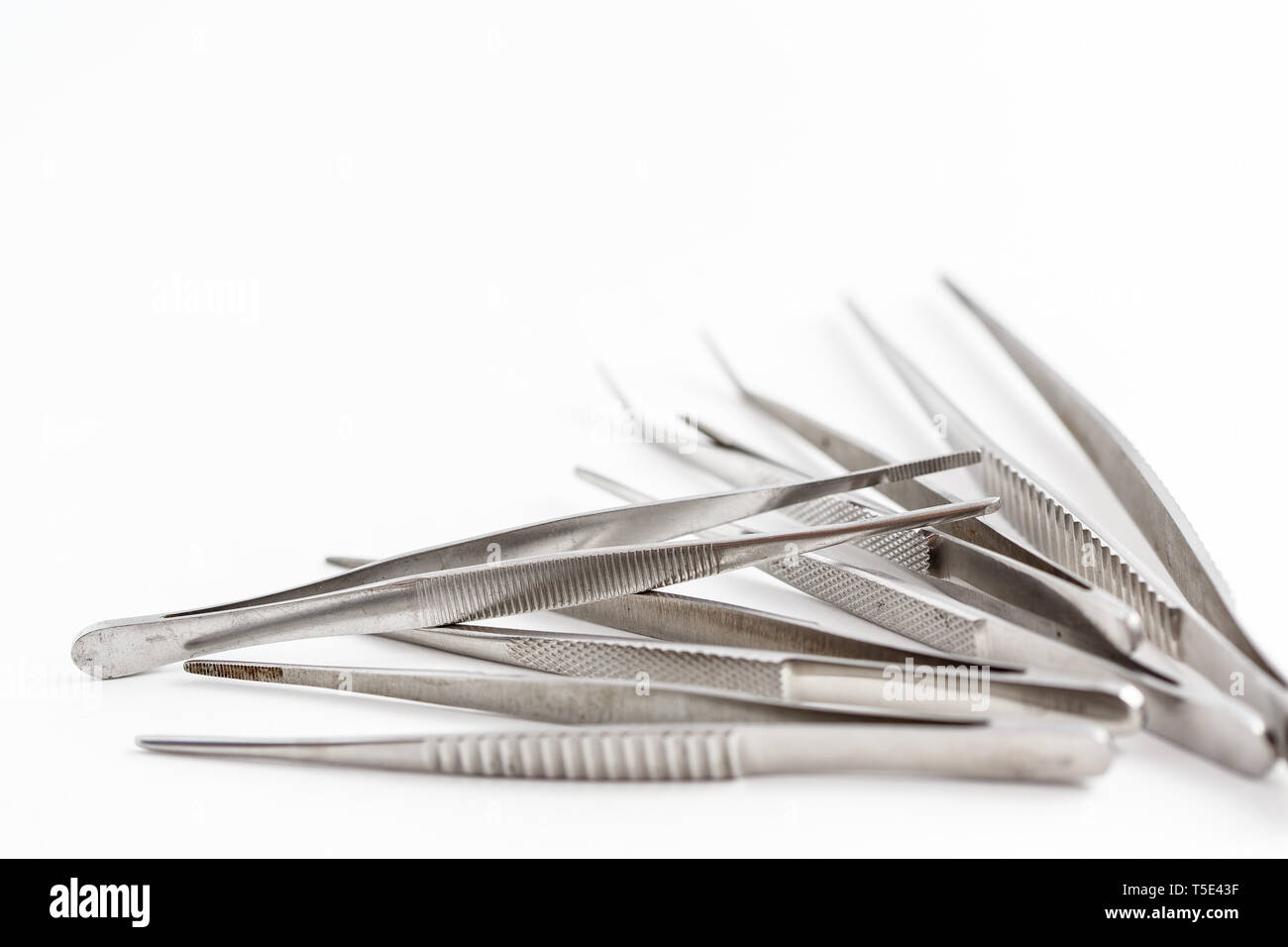 surgical instruments on white background Stock Photo - Alamy