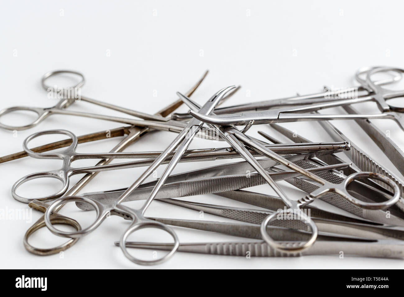 surgical instruments on white background Stock Photo - Alamy