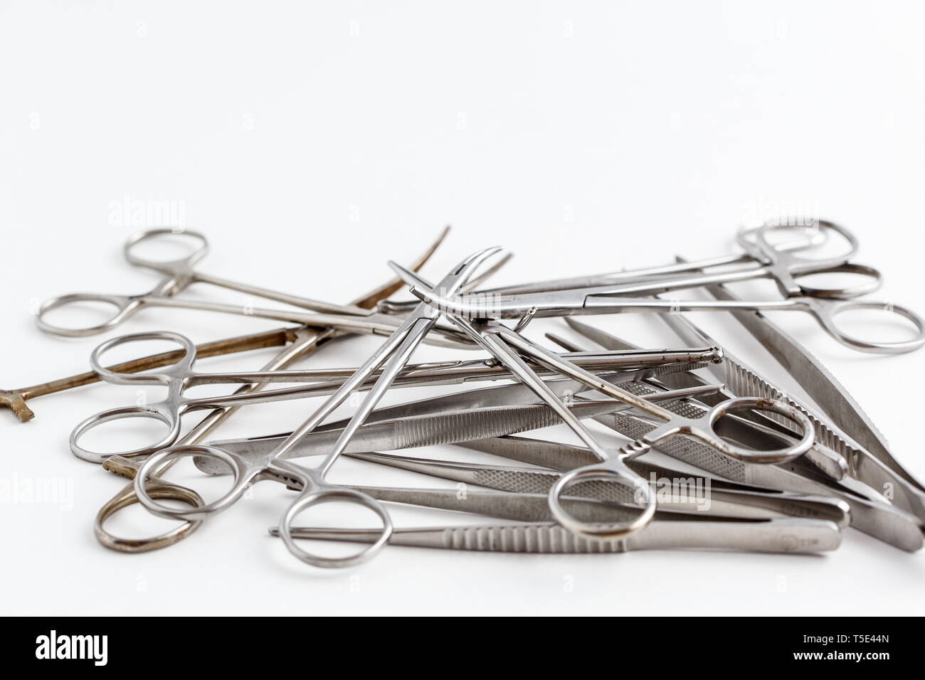 surgical instruments on white background Stock Photo - Alamy