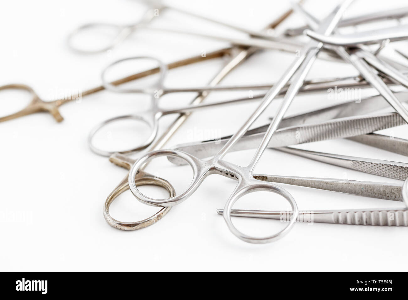 surgical instruments on white background Stock Photo - Alamy