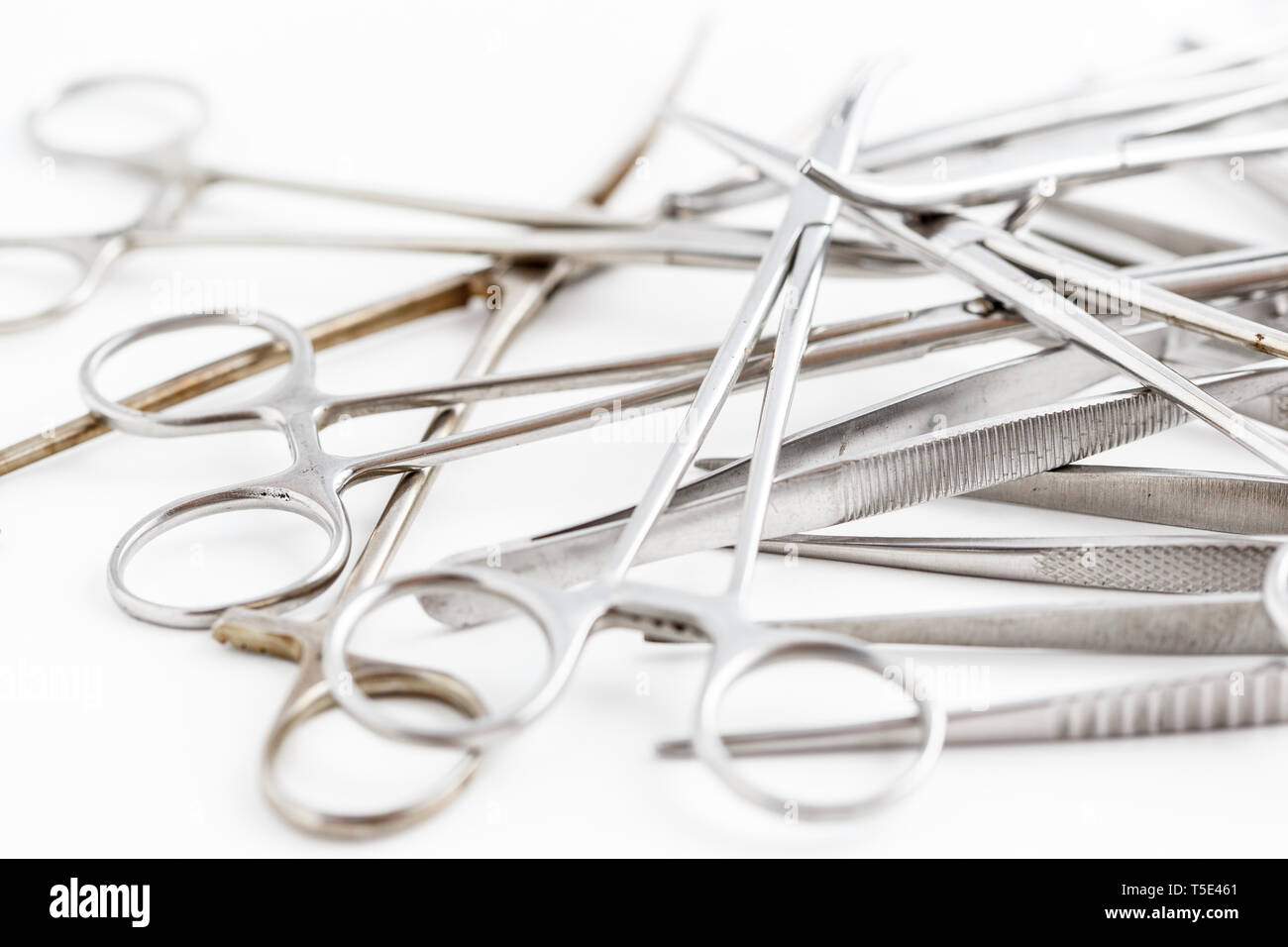surgical instruments on white background Stock Photo - Alamy