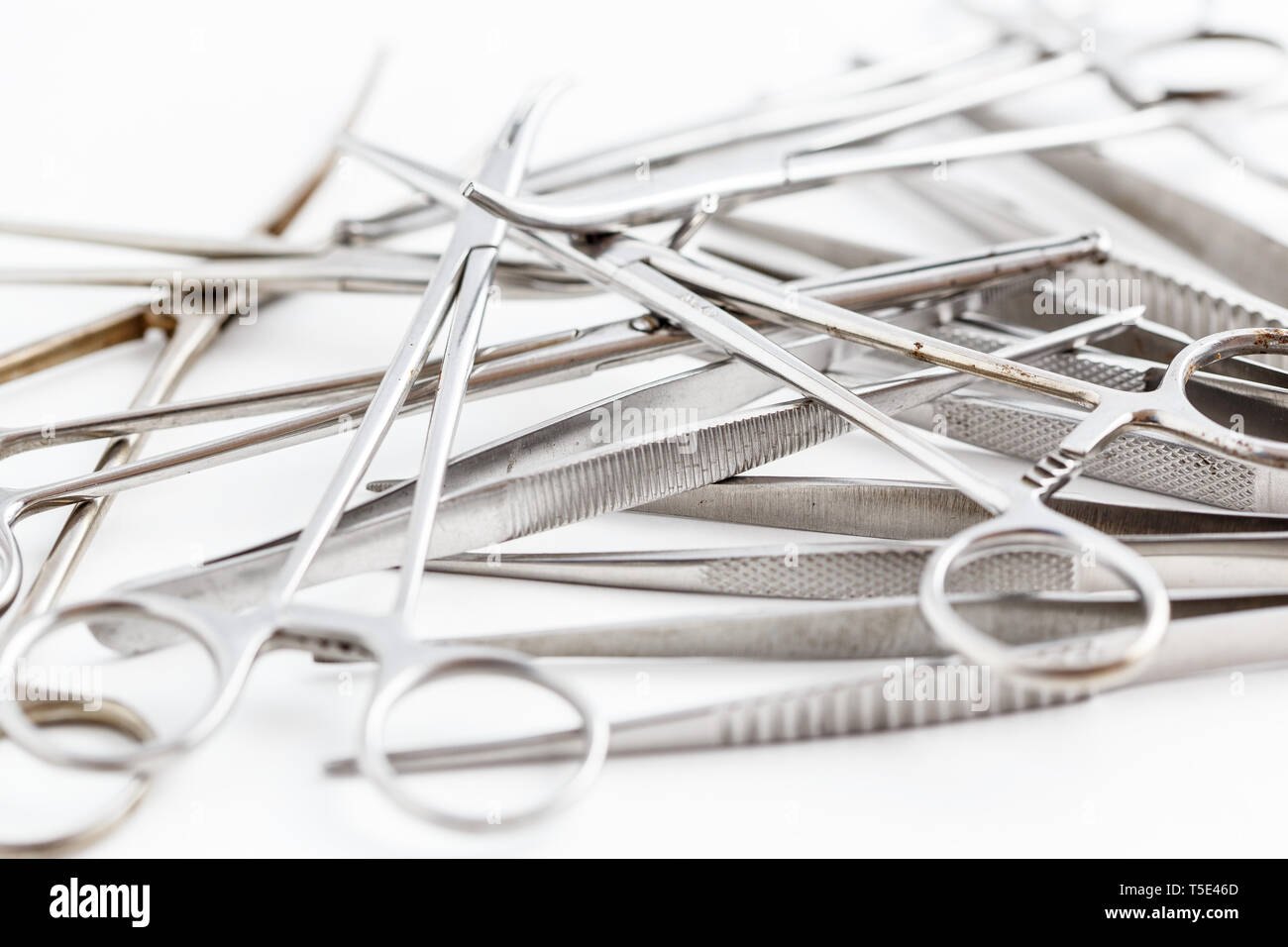 surgical instruments on white background Stock Photo - Alamy