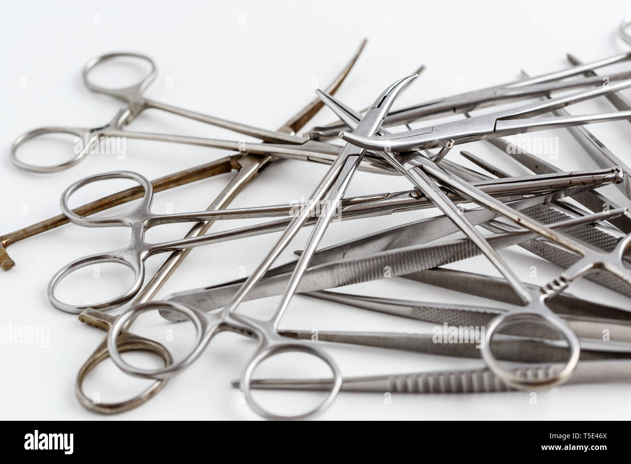 surgical instruments on white background Stock Photo - Alamy