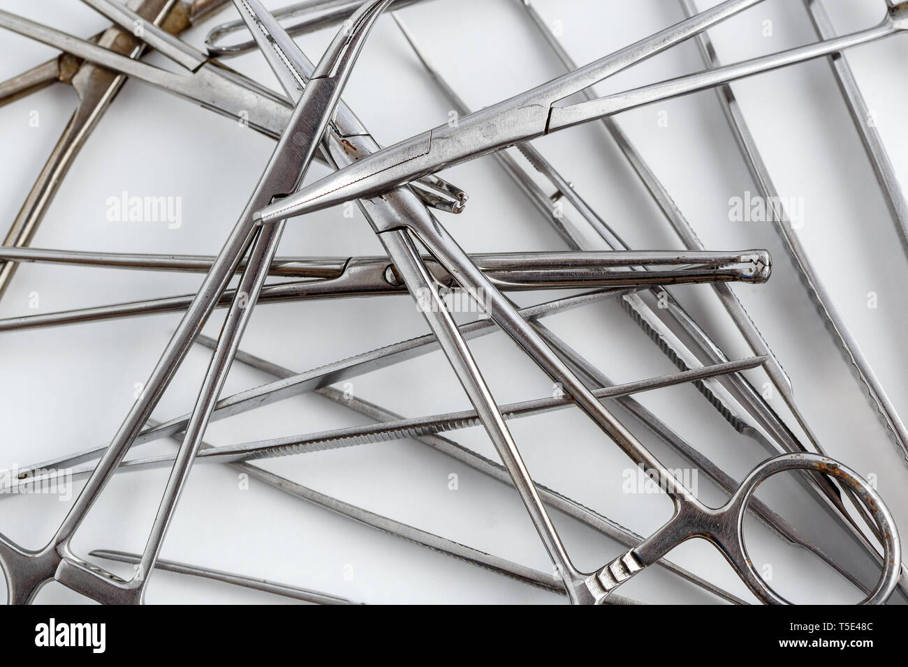 surgical instruments on white background Stock Photo - Alamy