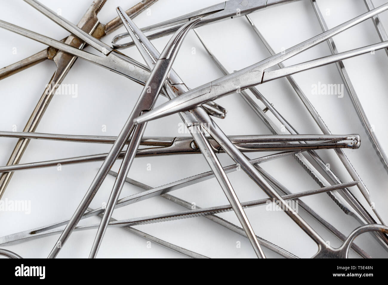 surgical instruments on white background Stock Photo - Alamy