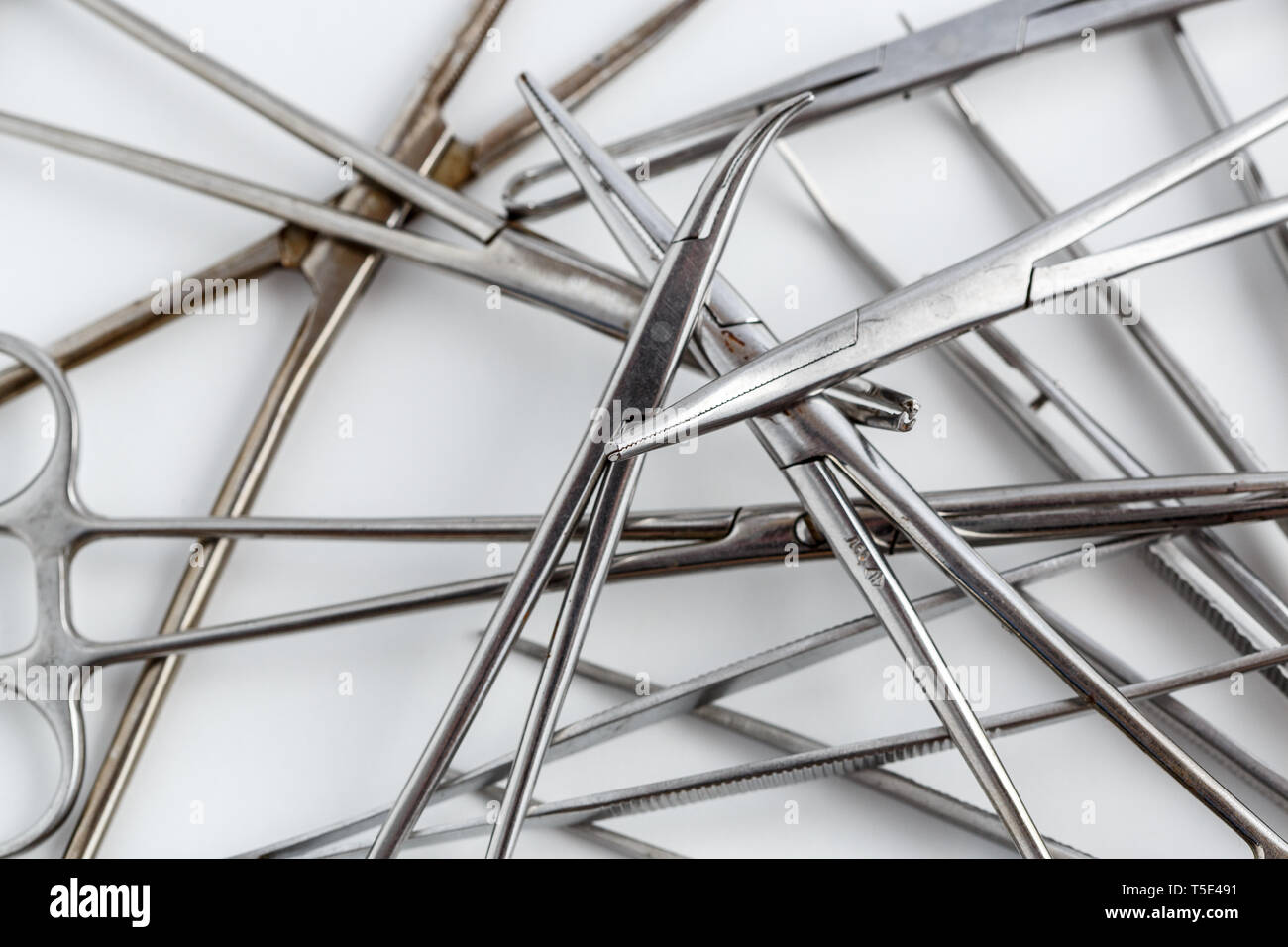 surgical instruments on white background Stock Photo - Alamy