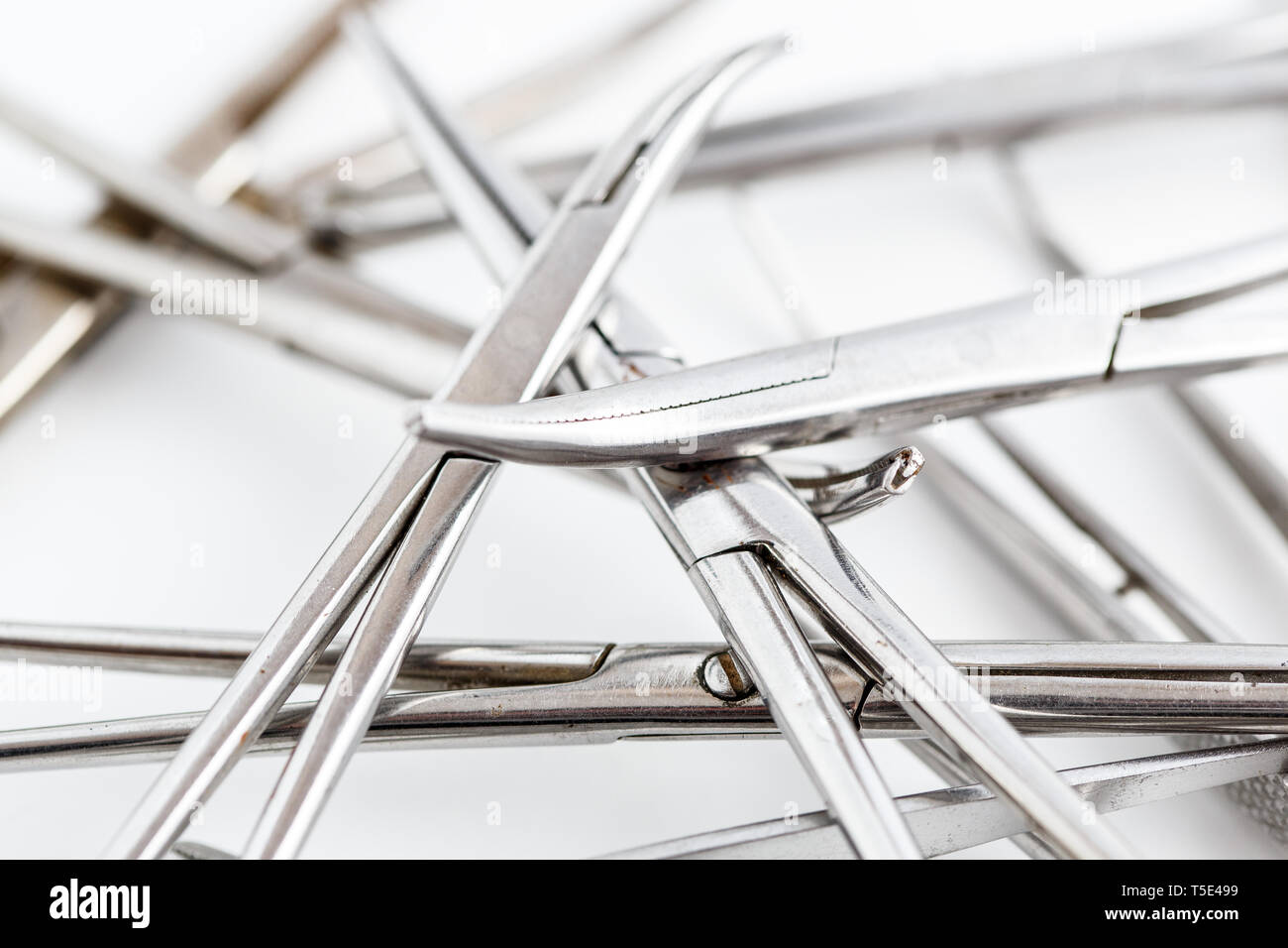 surgical instruments on white background Stock Photo - Alamy