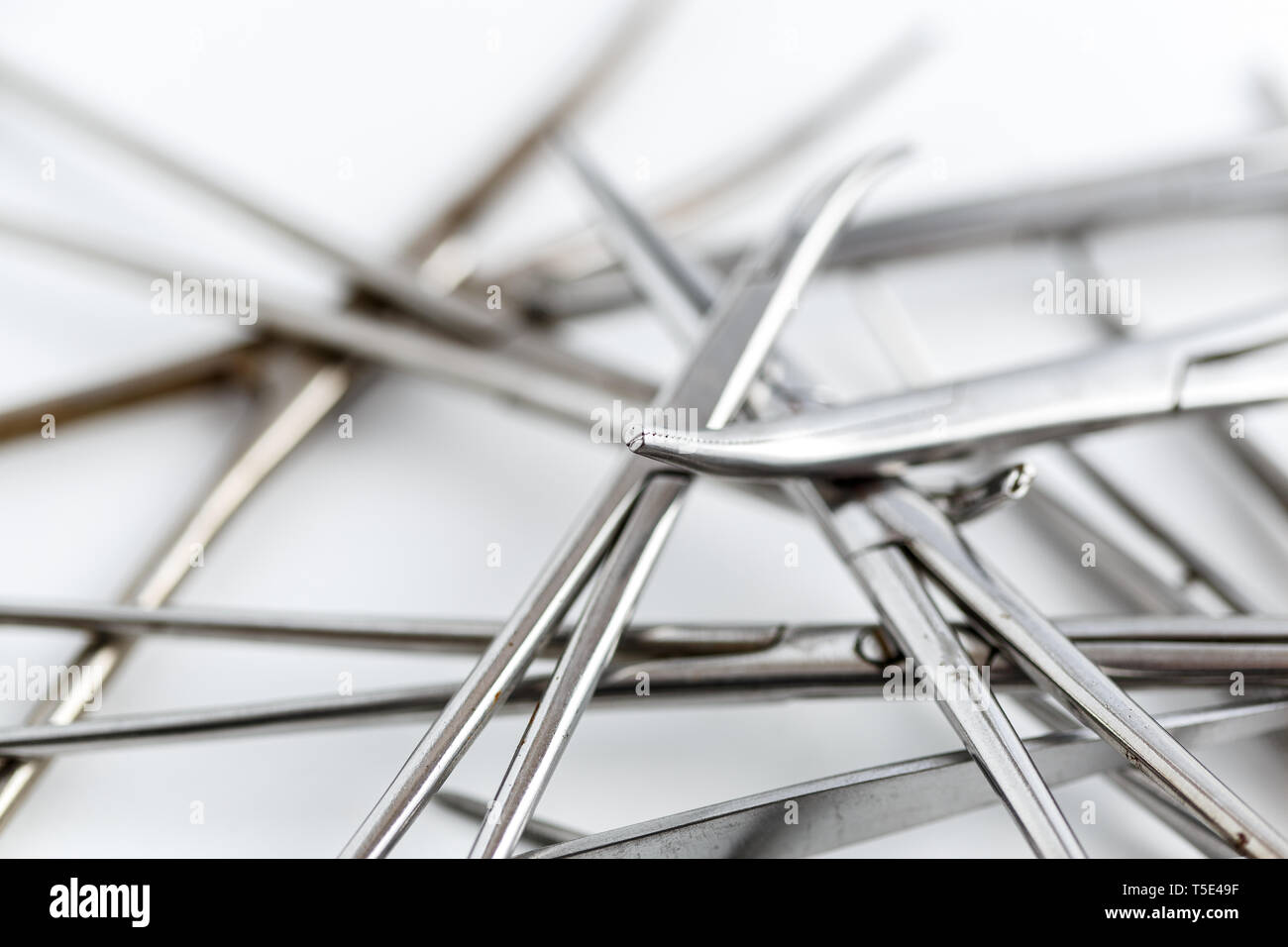 surgical instruments on white background Stock Photo - Alamy