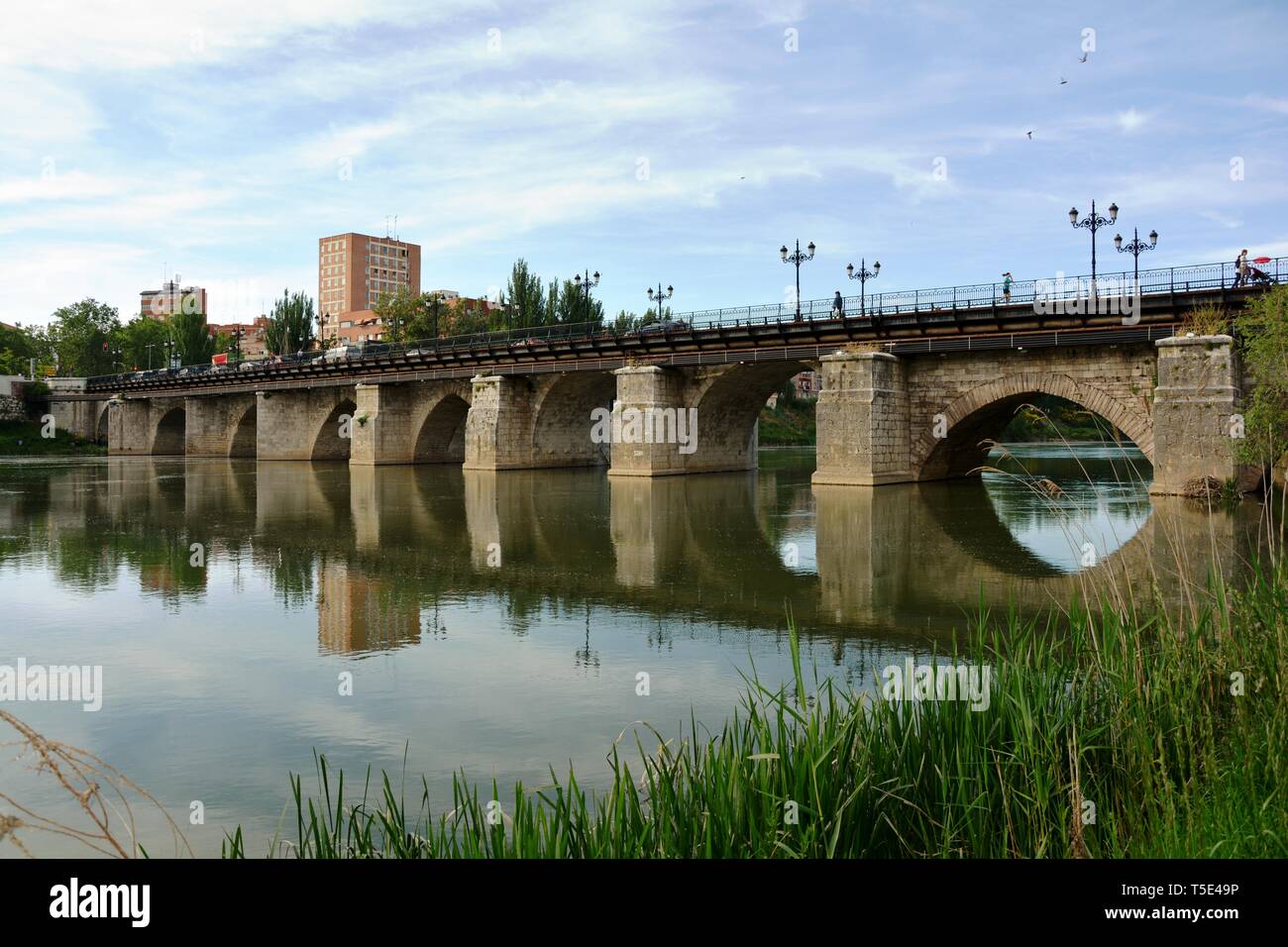 an ancient bridge, the river and the buildings Stock Photo - Alamy