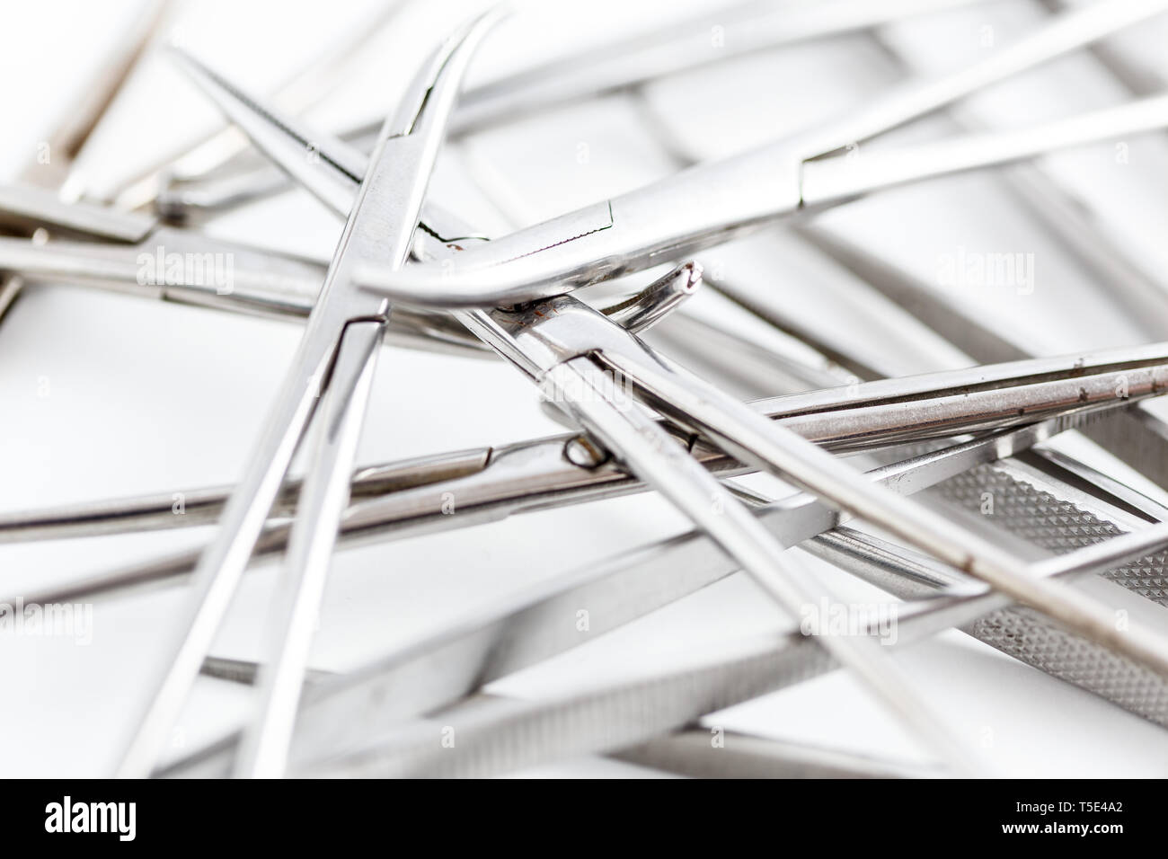 surgical instruments on white background Stock Photo - Alamy