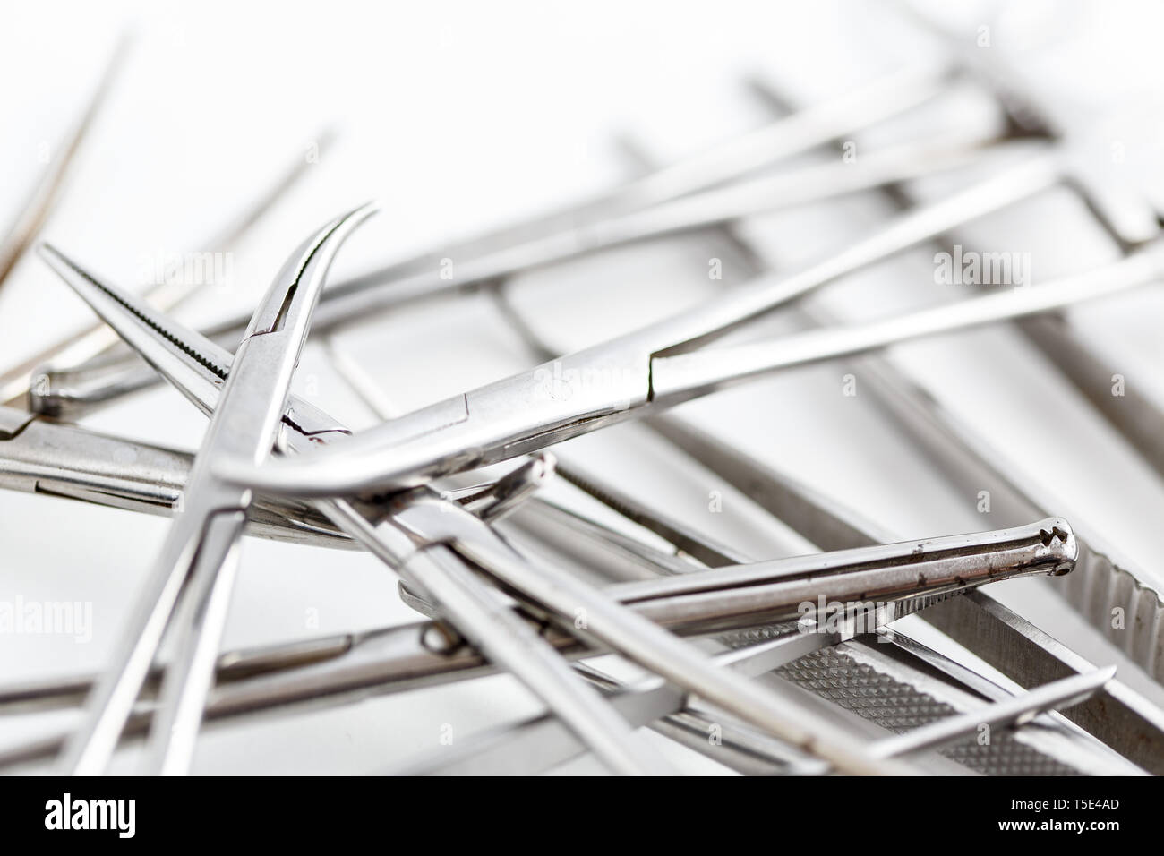 surgical instruments on white background Stock Photo - Alamy