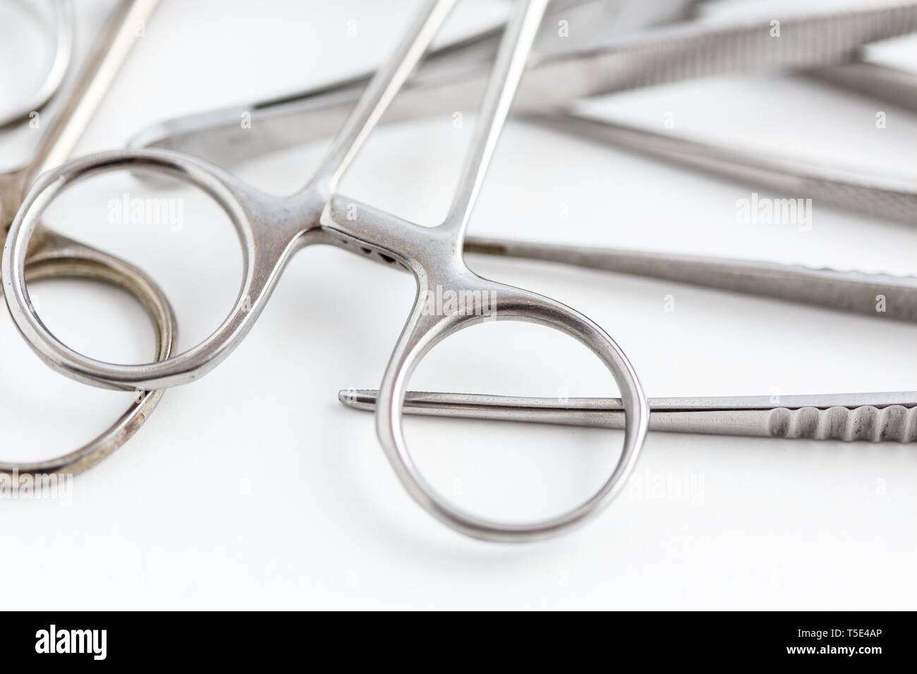 surgical instruments on white background Stock Photo - Alamy