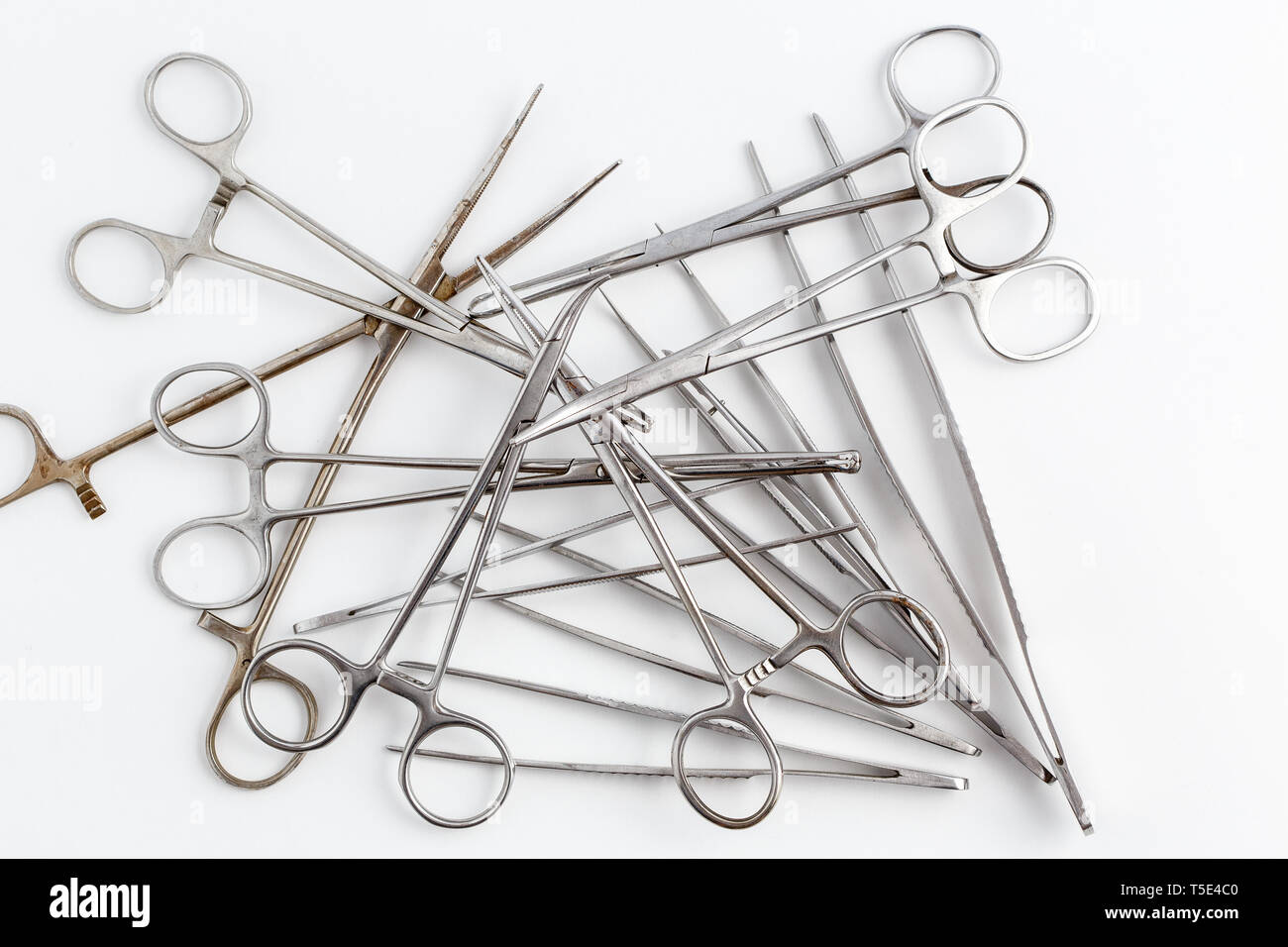 surgical instruments on white background Stock Photo - Alamy