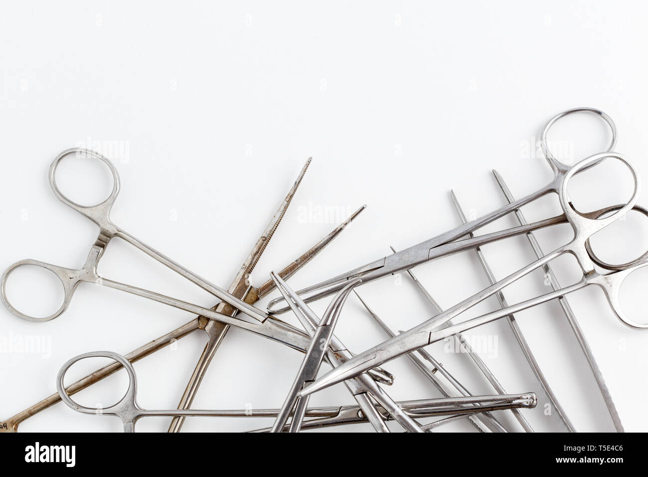 surgical instruments on white background Stock Photo - Alamy