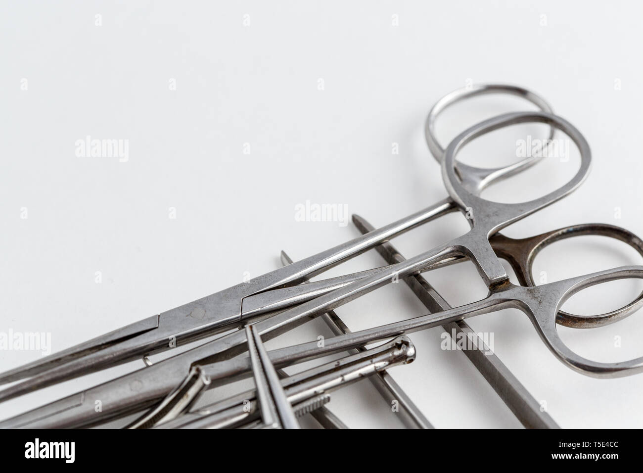 surgical instruments on white background Stock Photo - Alamy