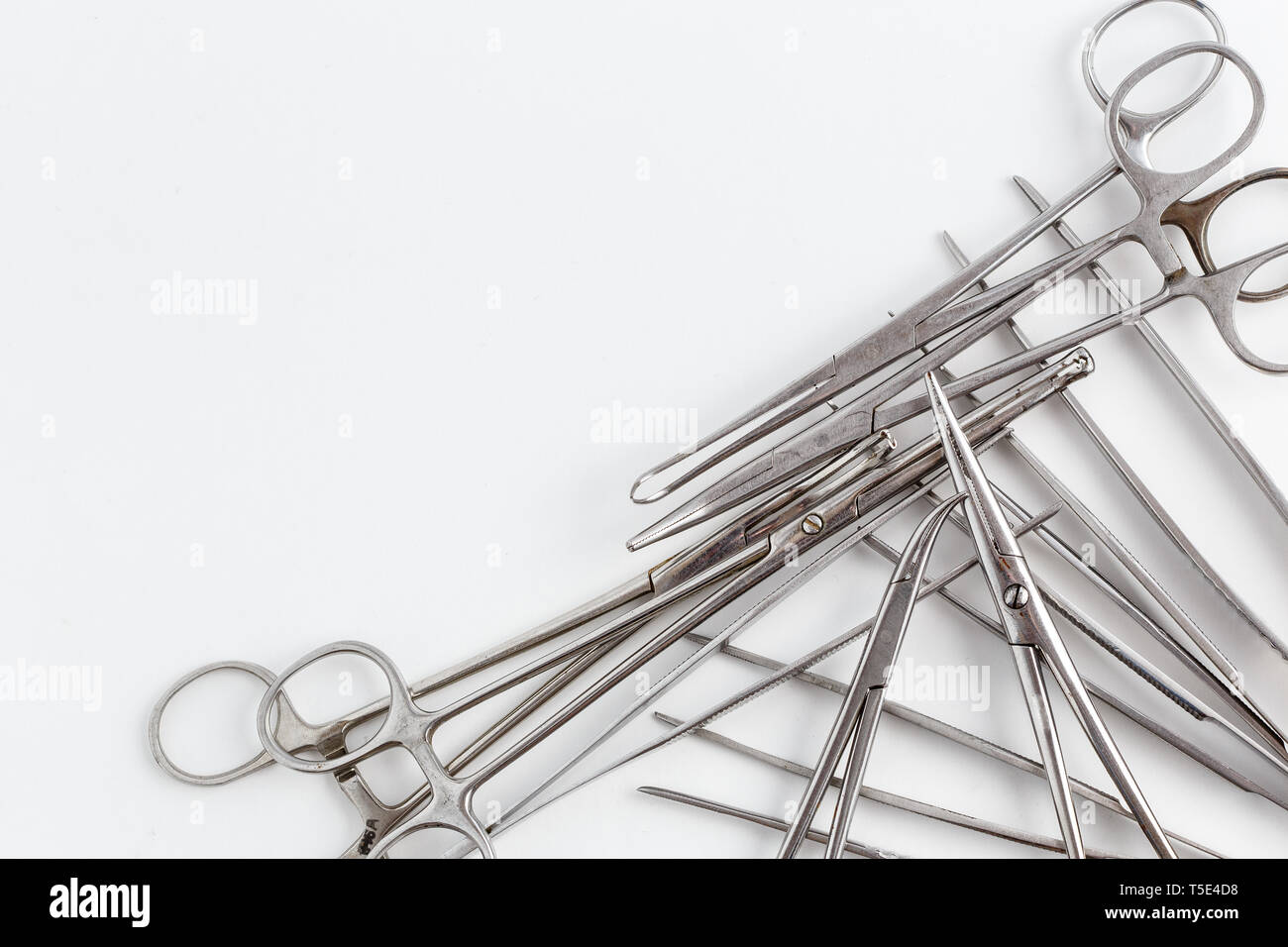 surgical instruments on white background Stock Photo - Alamy