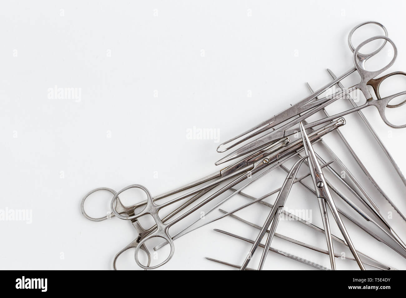 surgical instruments on white background Stock Photo - Alamy