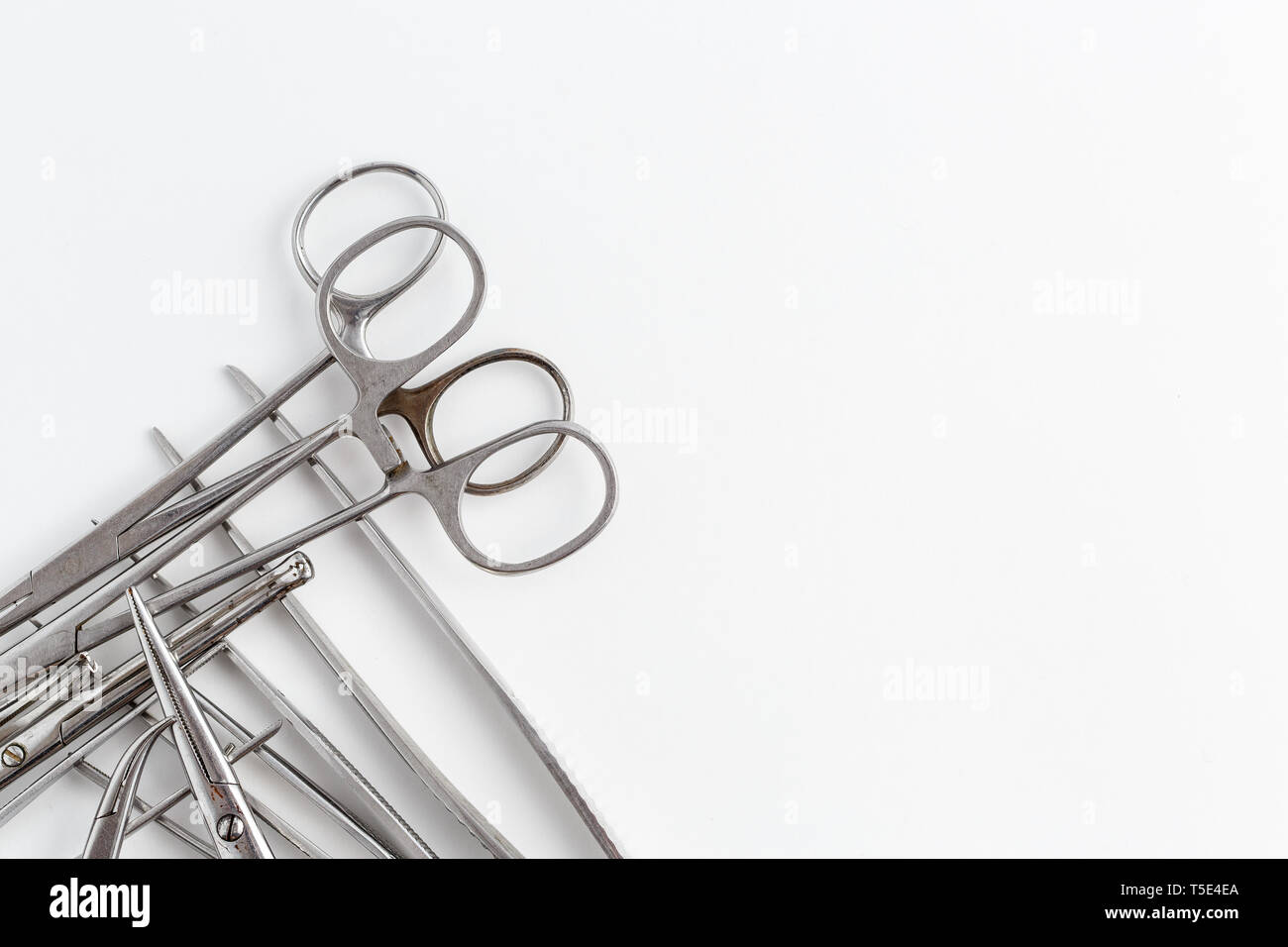 surgical instruments on white background Stock Photo - Alamy