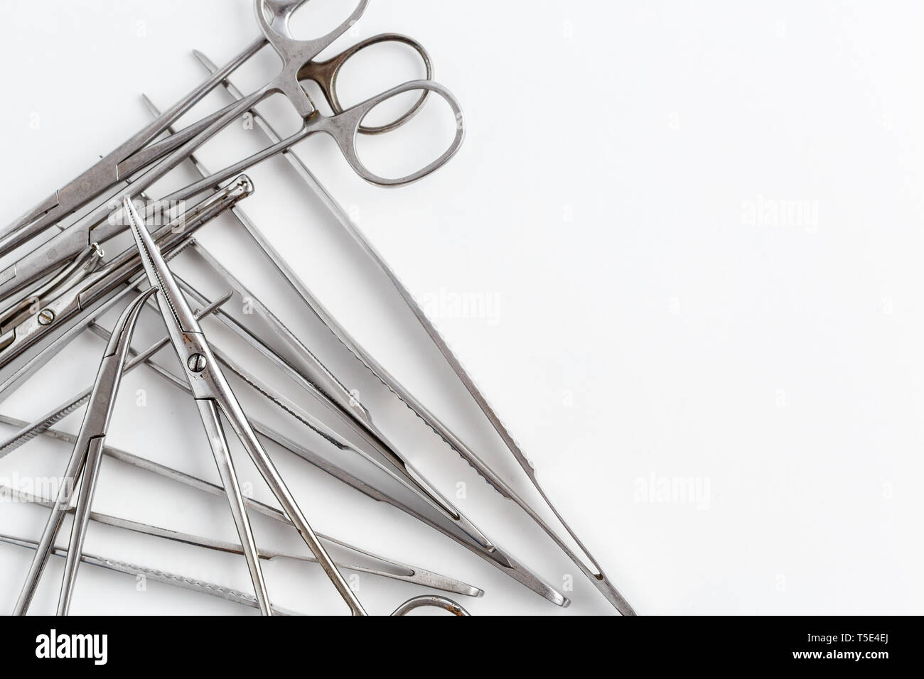 surgical instruments on white background Stock Photo - Alamy