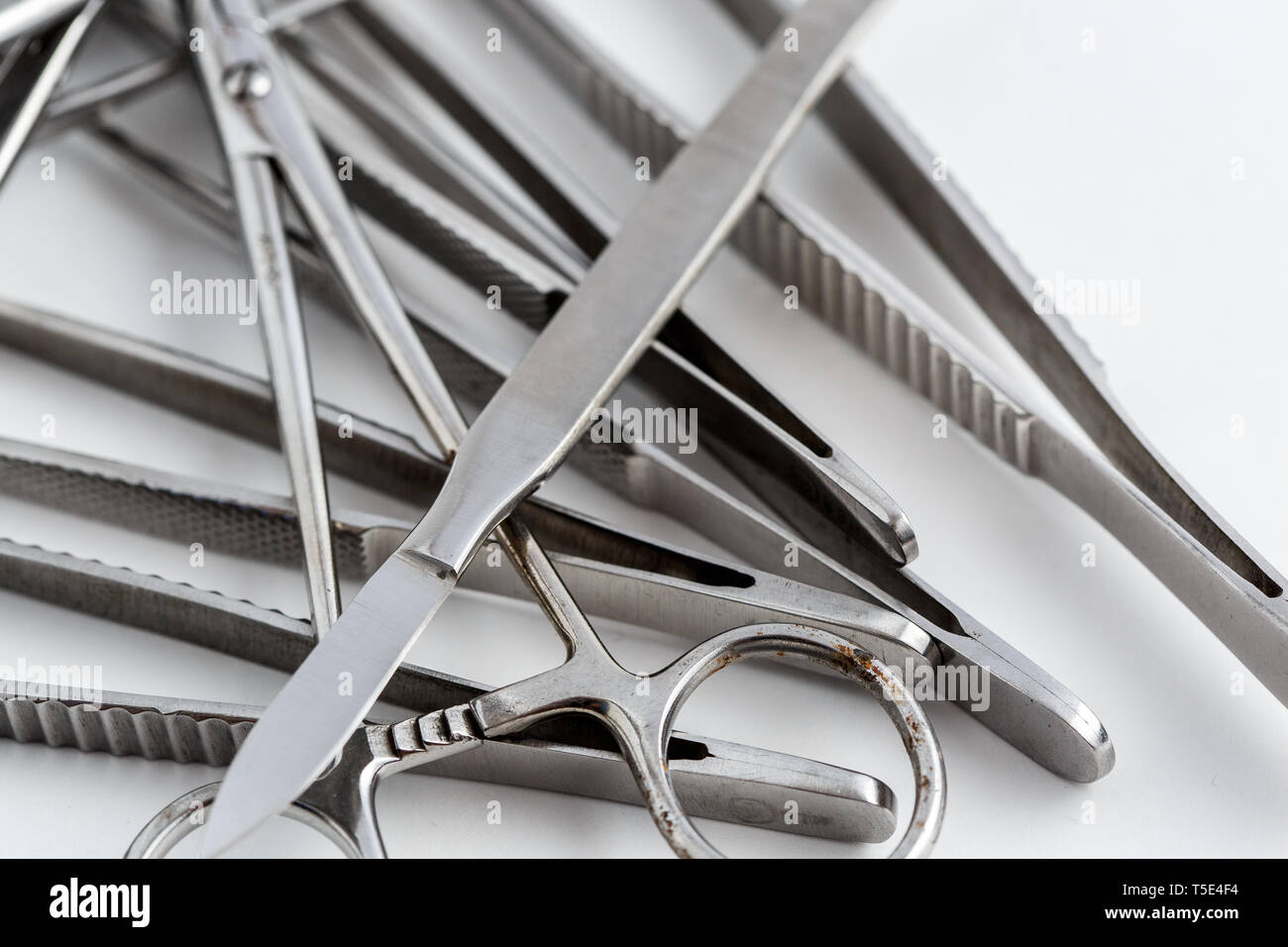 surgical instruments on white background Stock Photo - Alamy