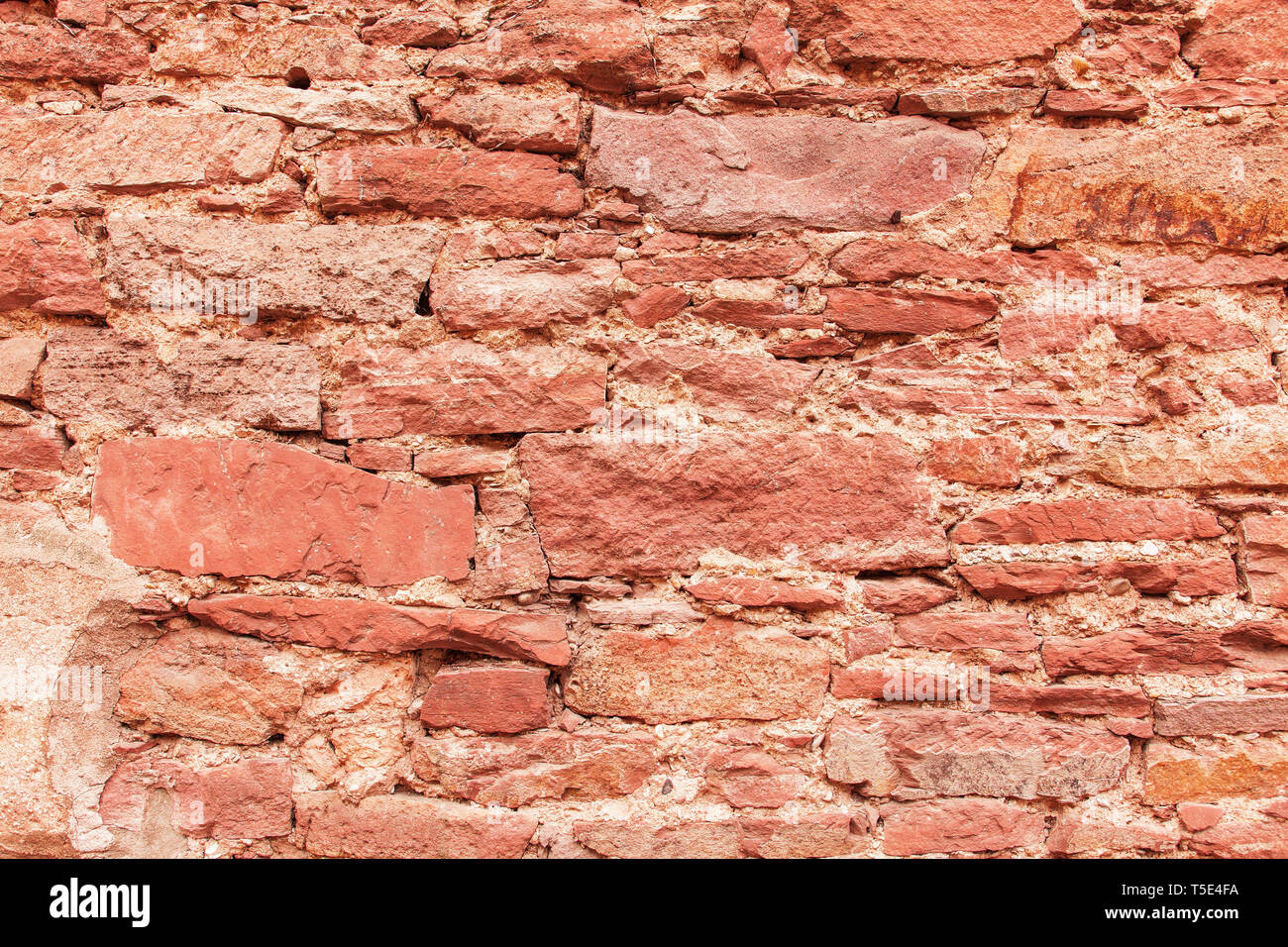 Red medieval brick wall background Stock Photo - Alamy