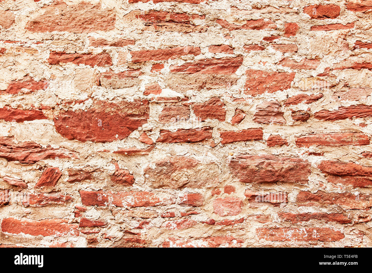 Red medieval brick wall background Stock Photo - Alamy