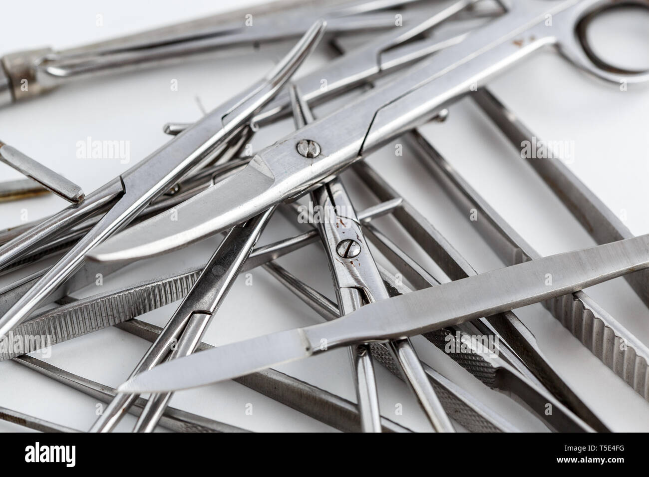 surgical instruments on white background Stock Photo - Alamy