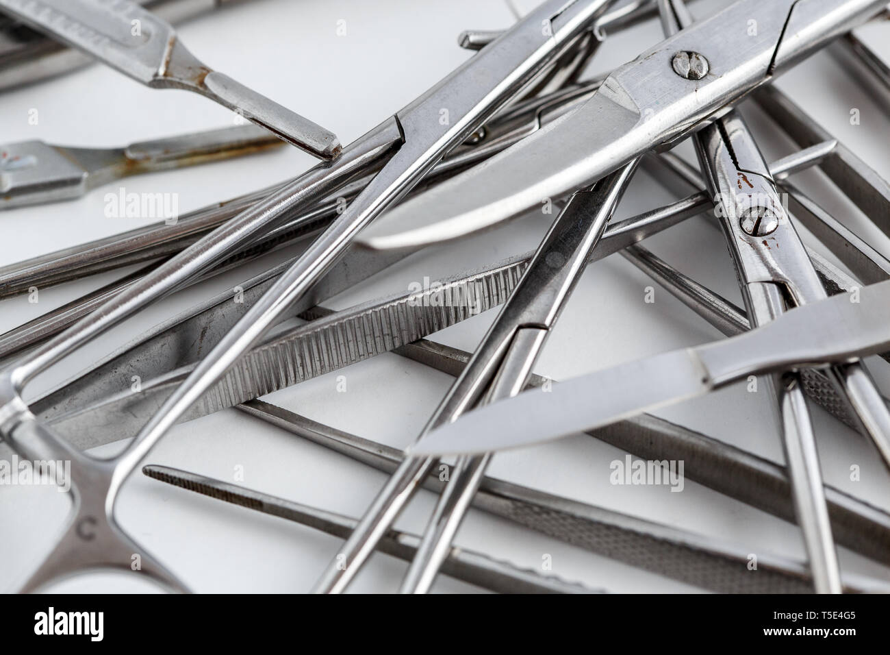 surgical instruments on white background Stock Photo - Alamy