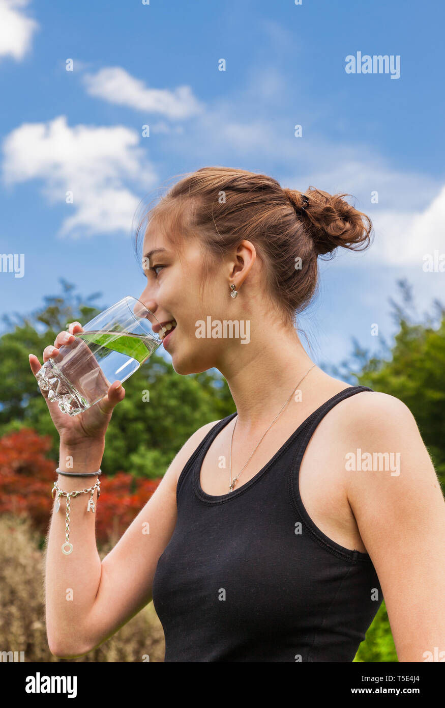 Attractive person drinking water hi-res stock photography and images ...