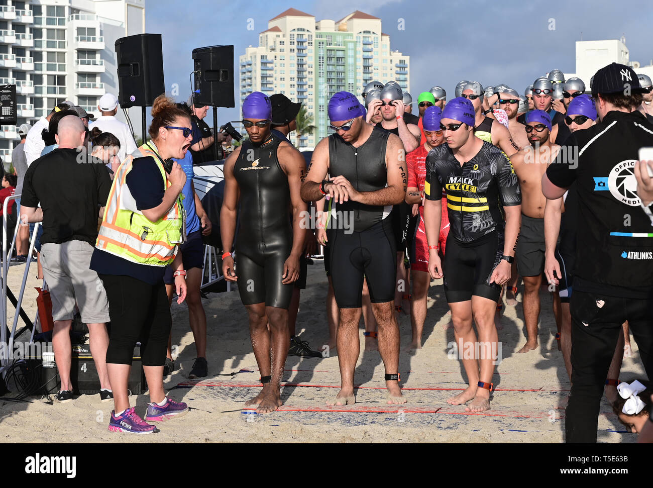 Miami Beach, Florida April 14, 2019 Four young male triathletes at the ...